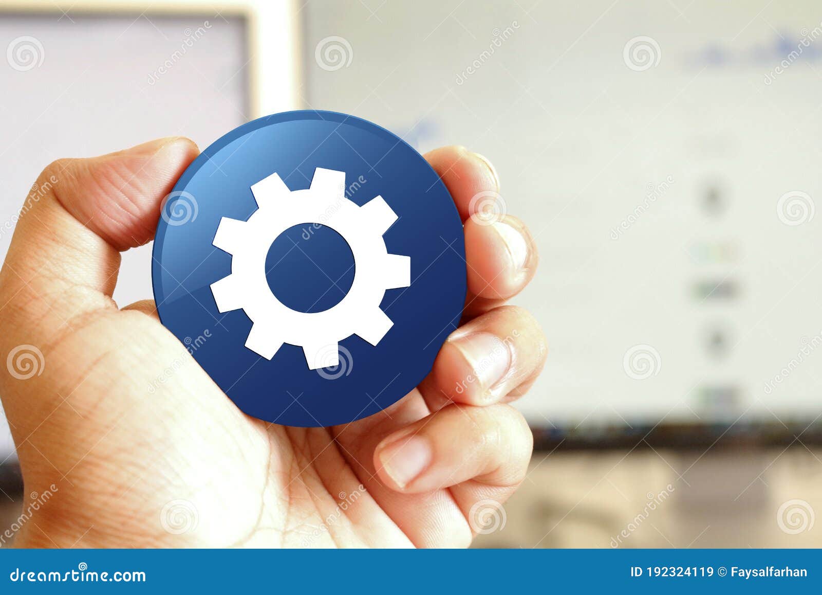 Process Icon Blue Round Button Holding by Hand Infront of Workspace ...