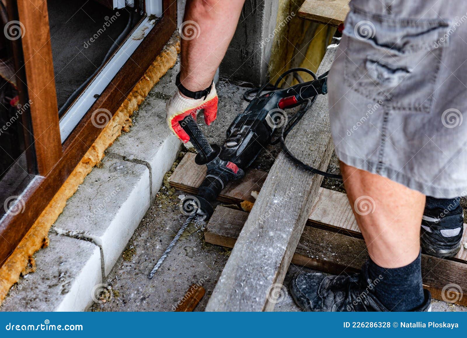 Process Installation Slopes of Window Using Drill. Stock Photo - Image ...