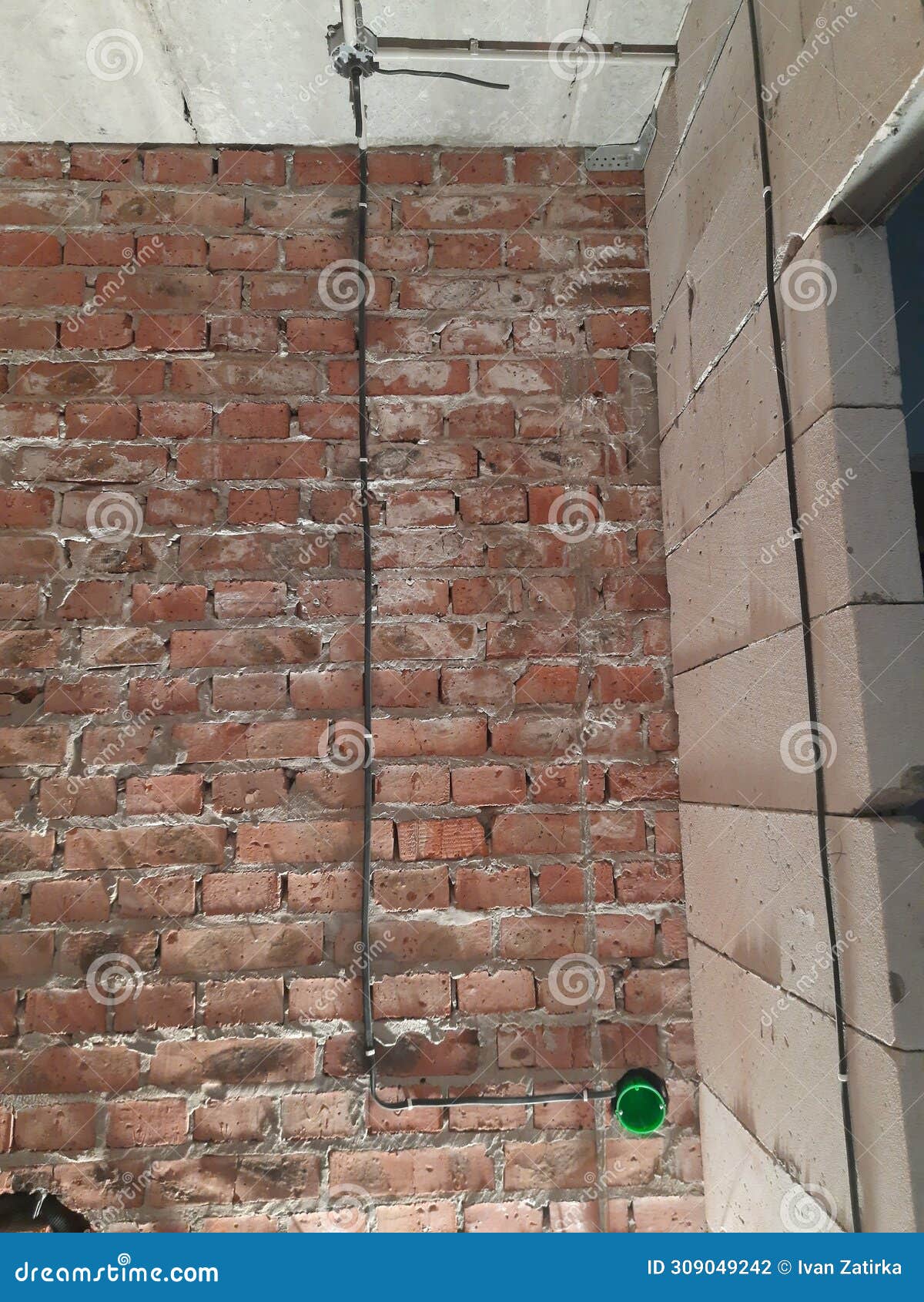 The Process of Installing Electric Wires in a Room. Stock Photo - Image ...