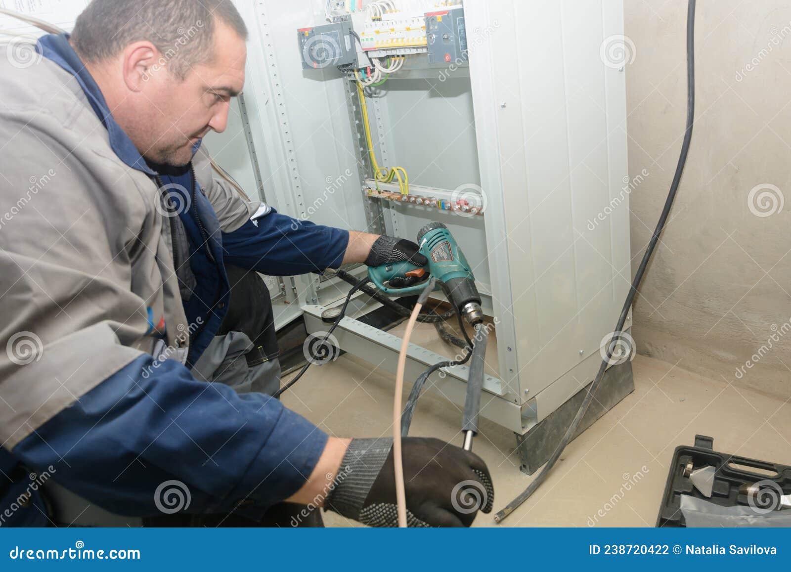 An Engineer Connects Magistral Optical Fiber Wires. A Man Commutes ...