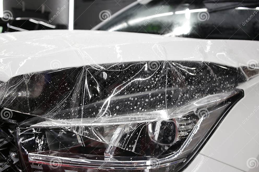 The Process of Installing PPF on the Hood of the Car. Anti-gravity ...