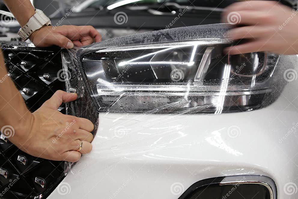 The Process of Installing PPF on the Hood of the Car. Anti-gravity ...