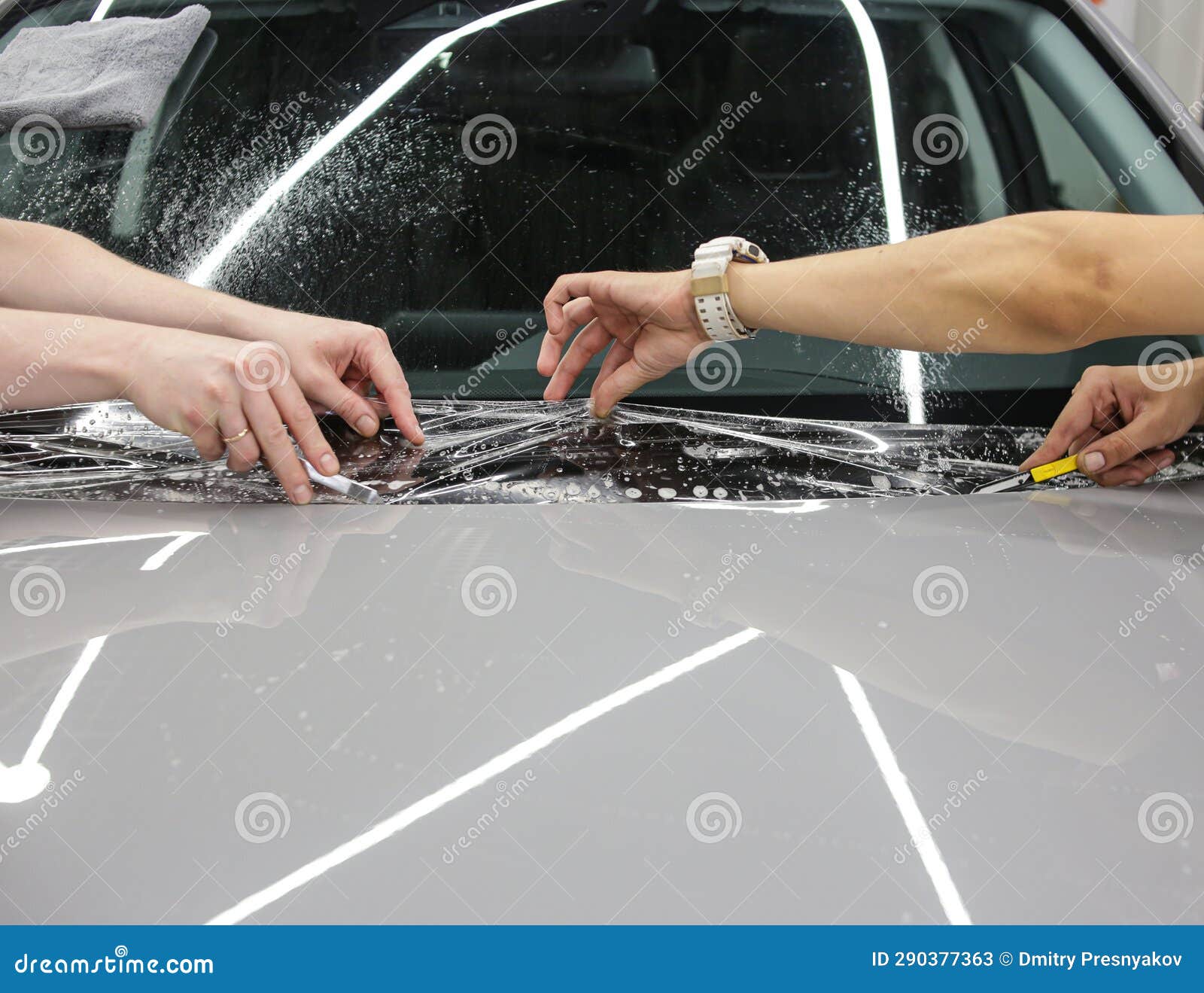 The Process of Installing PPF on the Hood of the Car. Anti-gravity ...