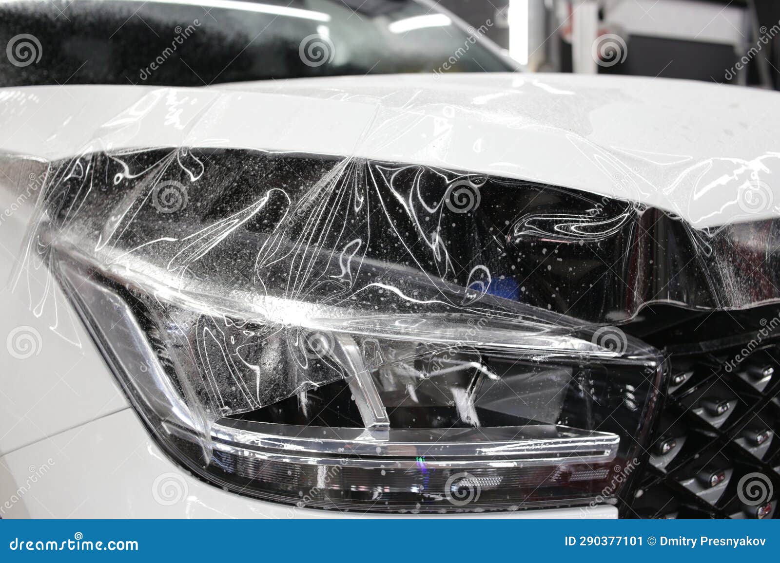 The Process of Installing PPF on the Hood of the Car. Anti-gravity ...