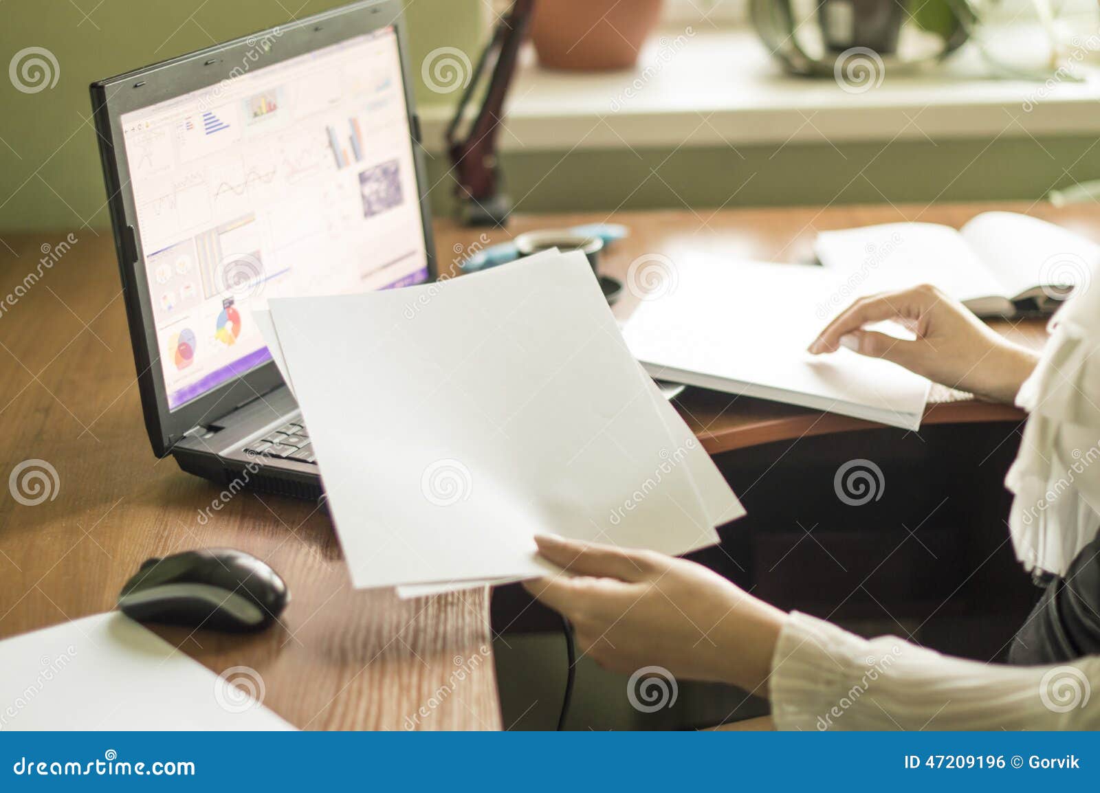 The Process of with a Laptop and Documents on a Office Desk Stock Photo ...