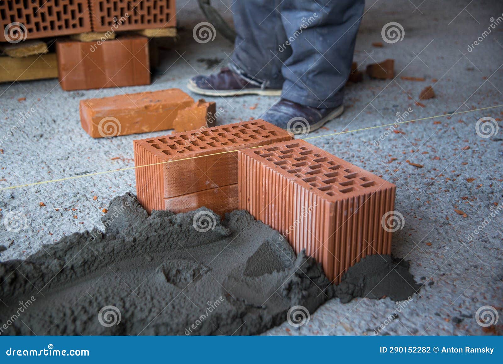 The Process of Laying Bricks on Construction Site Stock Photo - Image ...