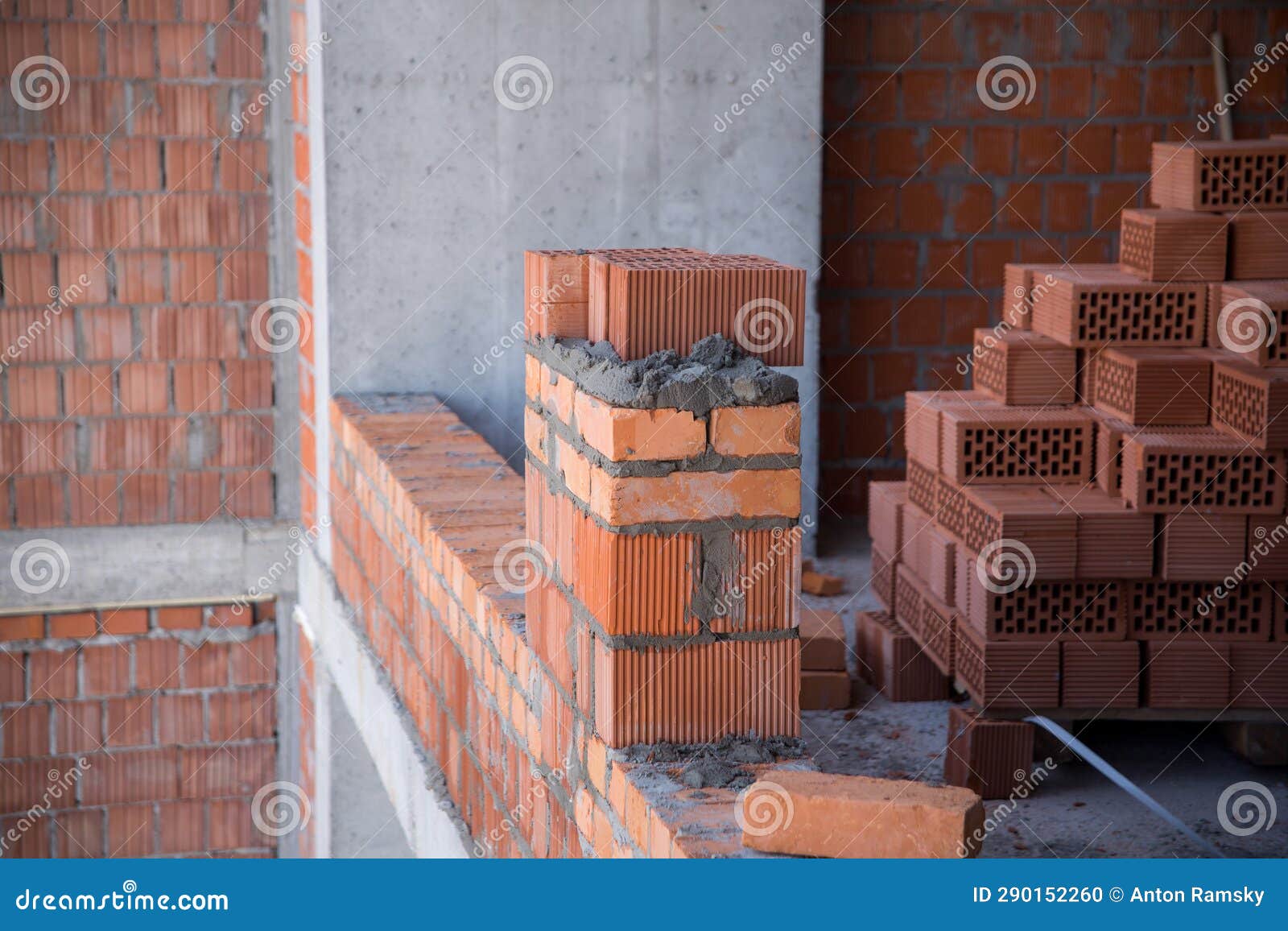The Process of Laying Bricks on Construction Site Stock Photo - Image ...