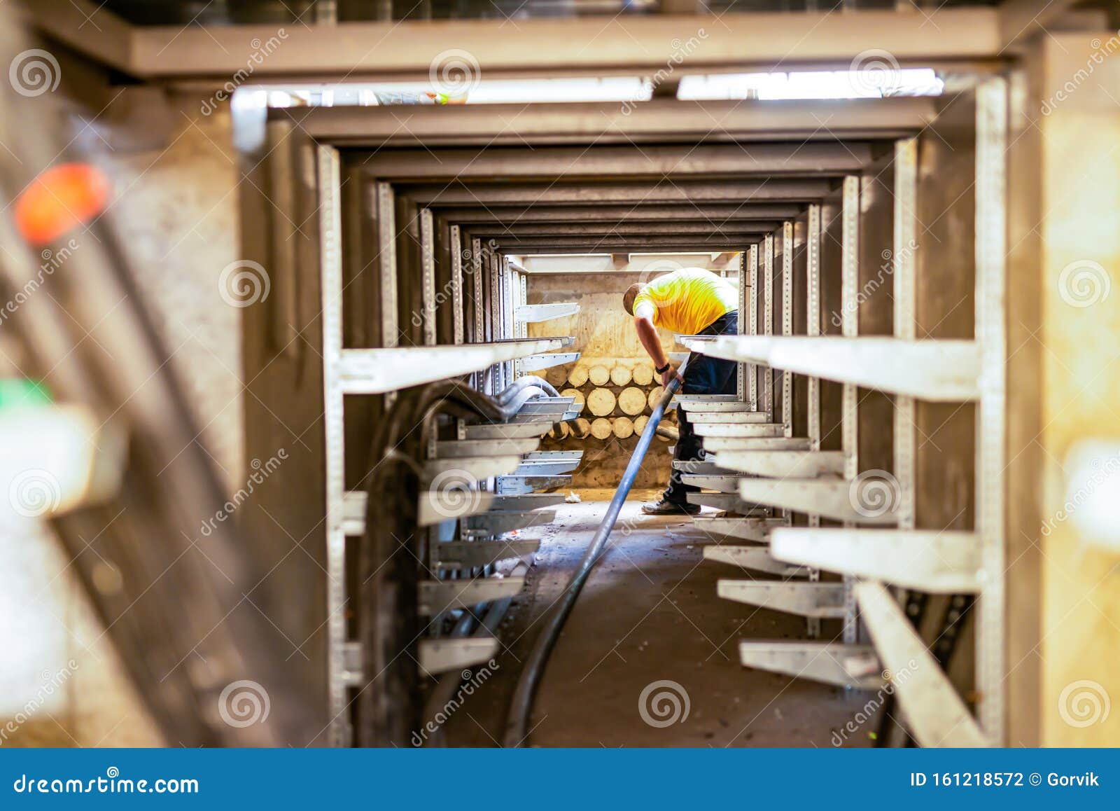 The Process of Laying a High-voltage Cable in a Cable Tunnel Stock ...