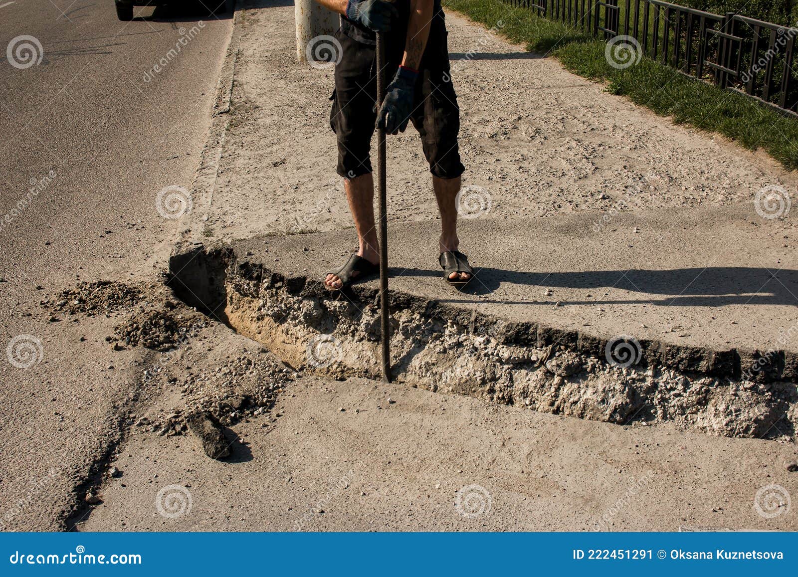 The Process of Laying the Sidewalk Curb. Workers Prepare a Trench for ...
