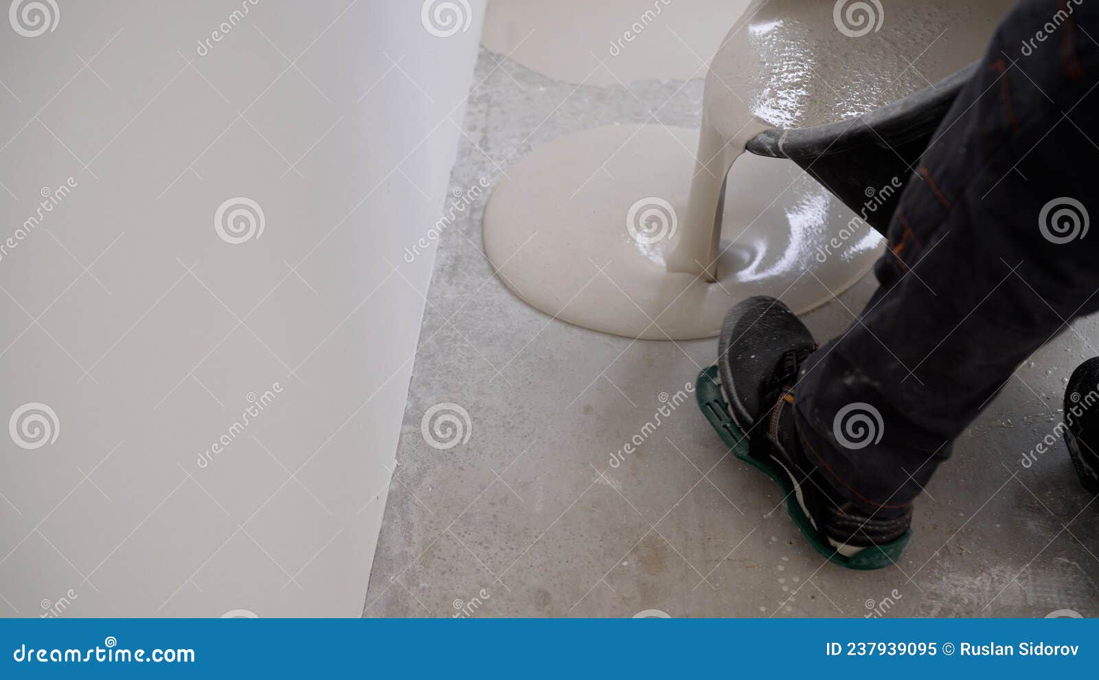 The Process of Leveling the Floor with a Solution. Self-leveling Bulk ...