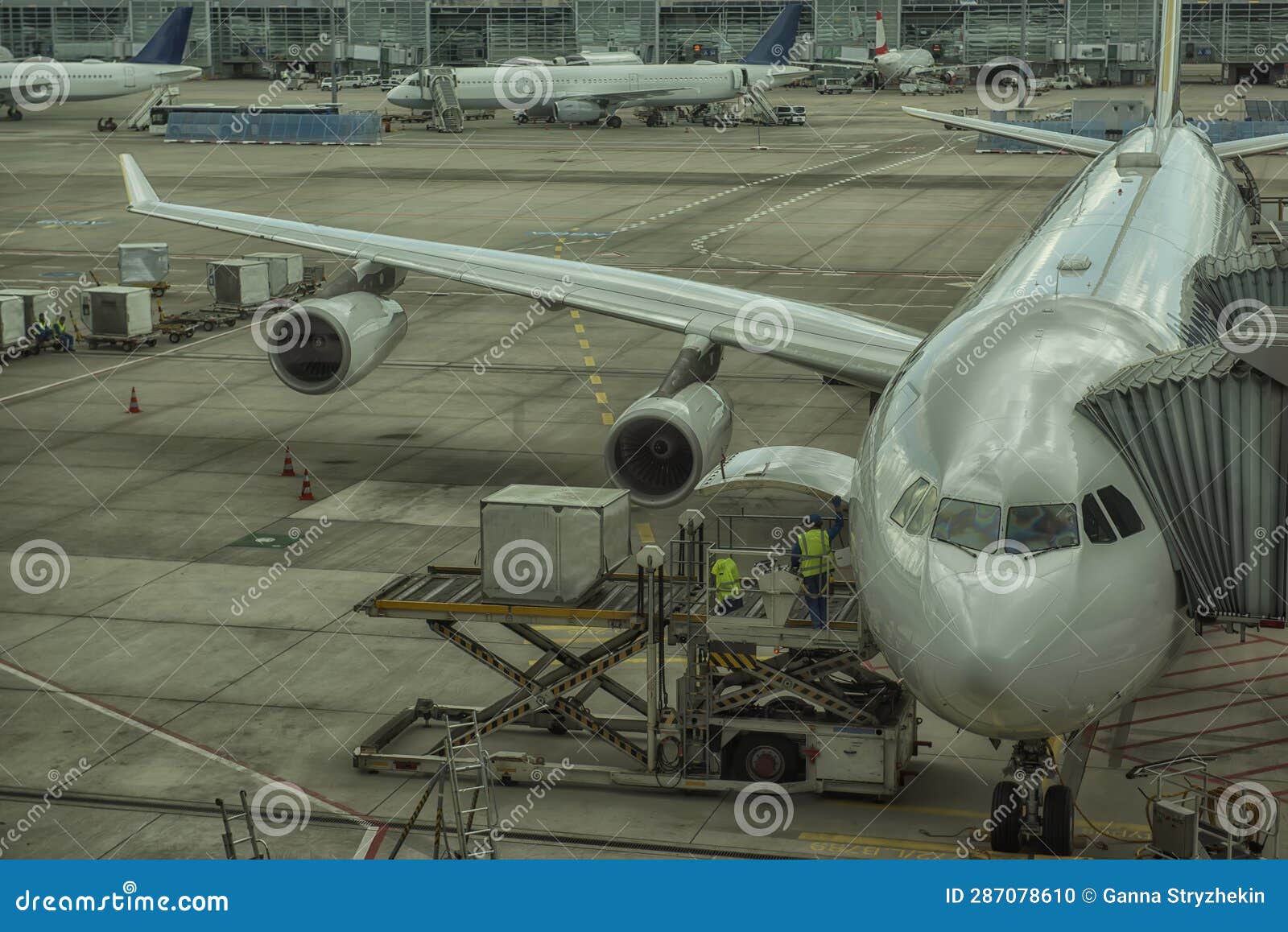 The Process of Loading Cargo on Board a Passenger Aircraft at the ...