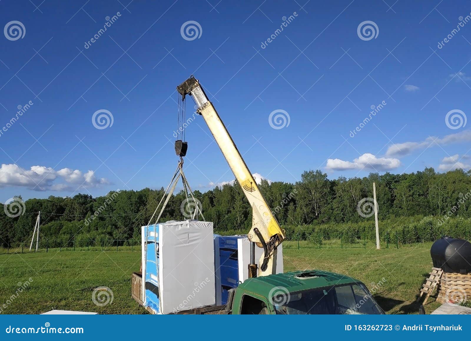 The Process Of Loading And Unloading Using A Mobile Crane Blocks And ...