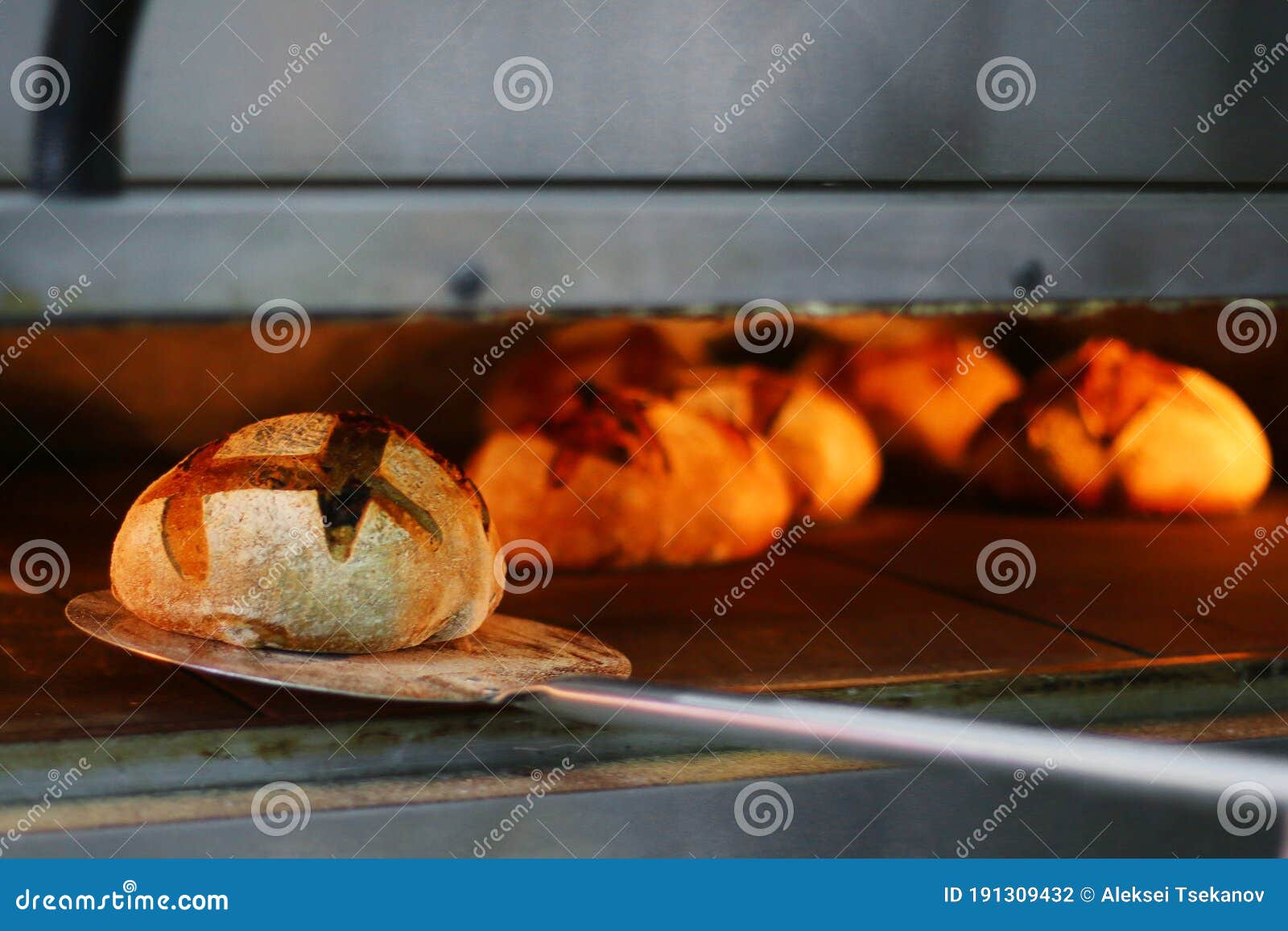 Process of Making Bread. Bread in Oven Closeup Stock Photo - Image of ...