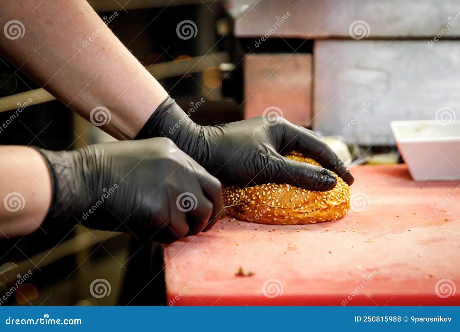 The Process Of Making A Burger In A Restaurant Kitchen. The Chef In ...