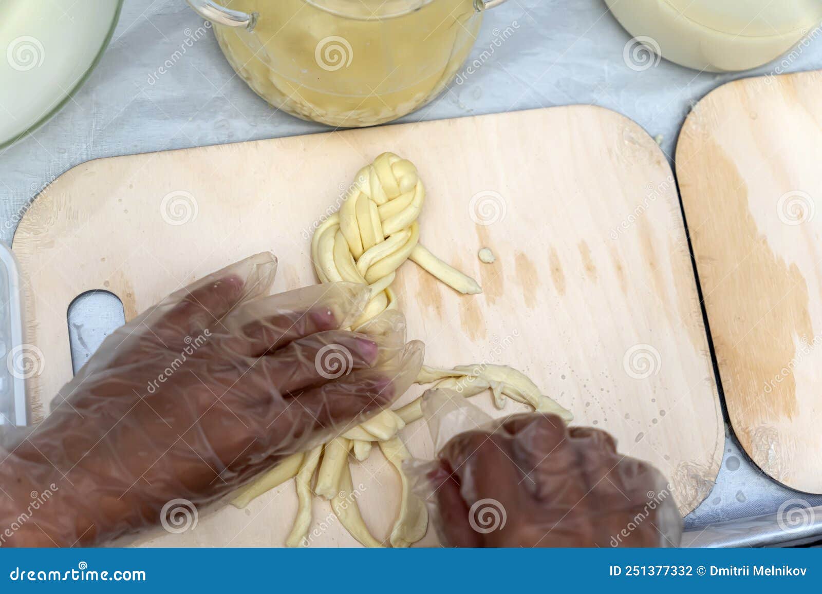 Process of Making Cheese with a Pigtail. Hands Braid Cheese in a Braid ...