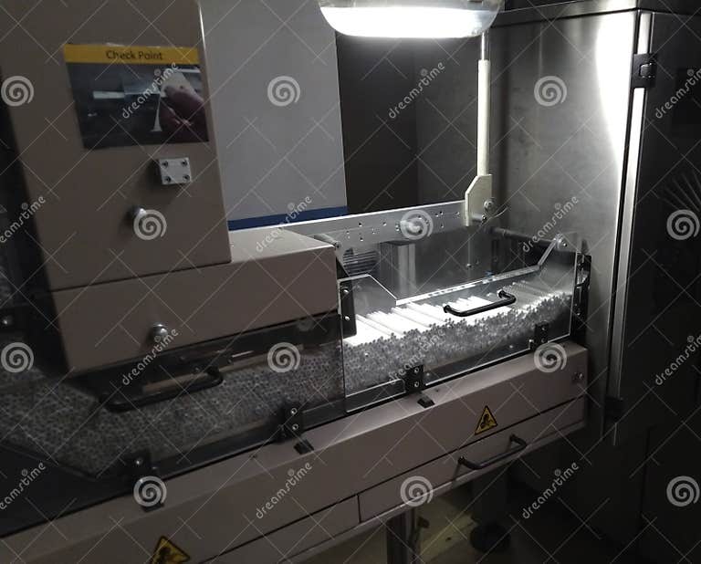 The Process of Making Cigarettes in a Tobacco Factory. Automated ...