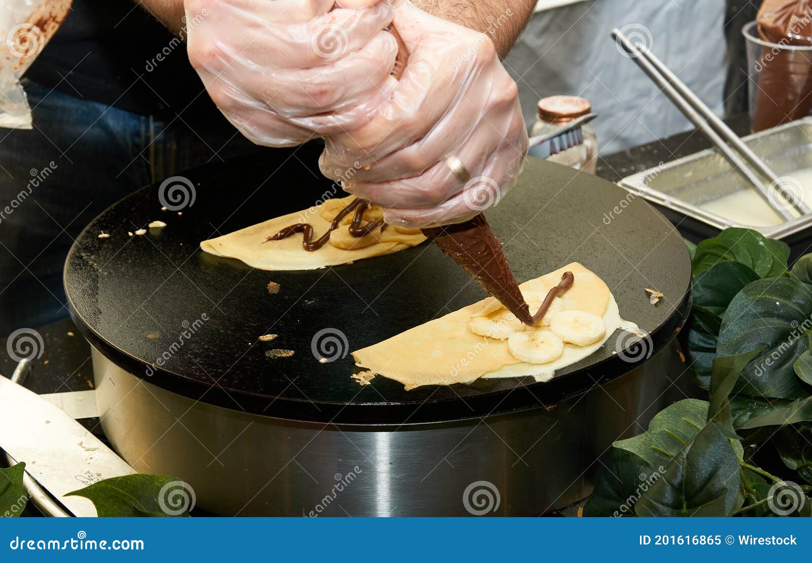Process of Making Crepes with Bananas and Chocolate Syrup Stock Image ...