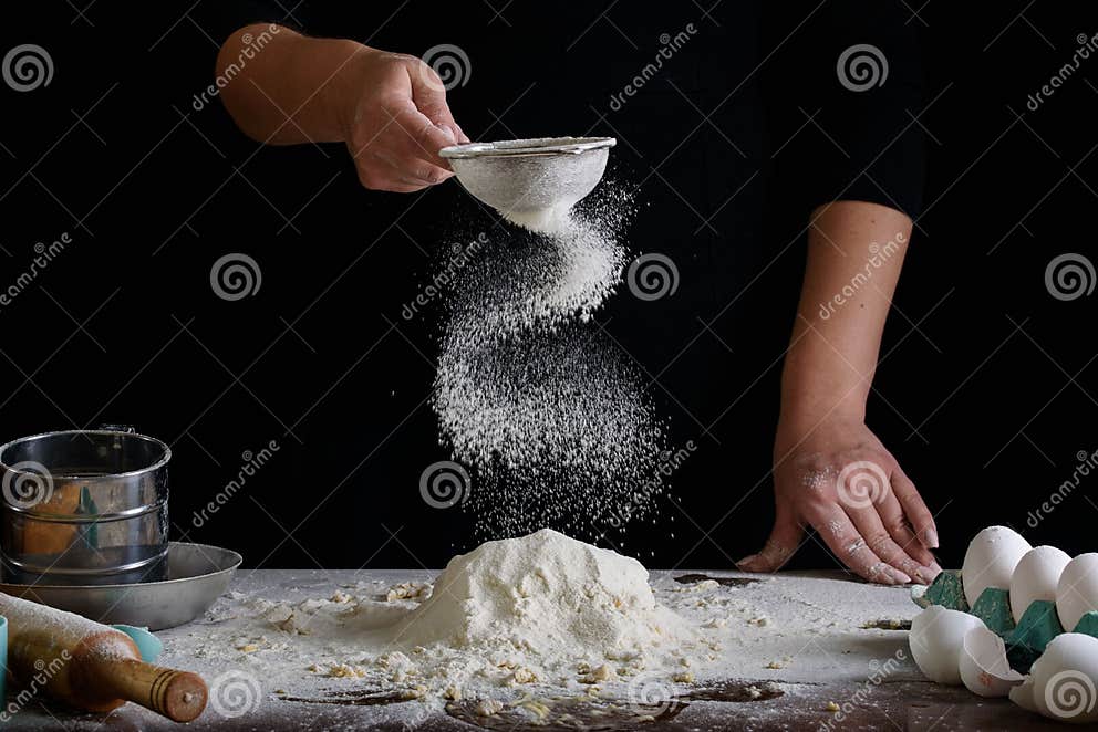 The Process of Making Cupcakes, Coating a Cream from a Pastry Bag in ...