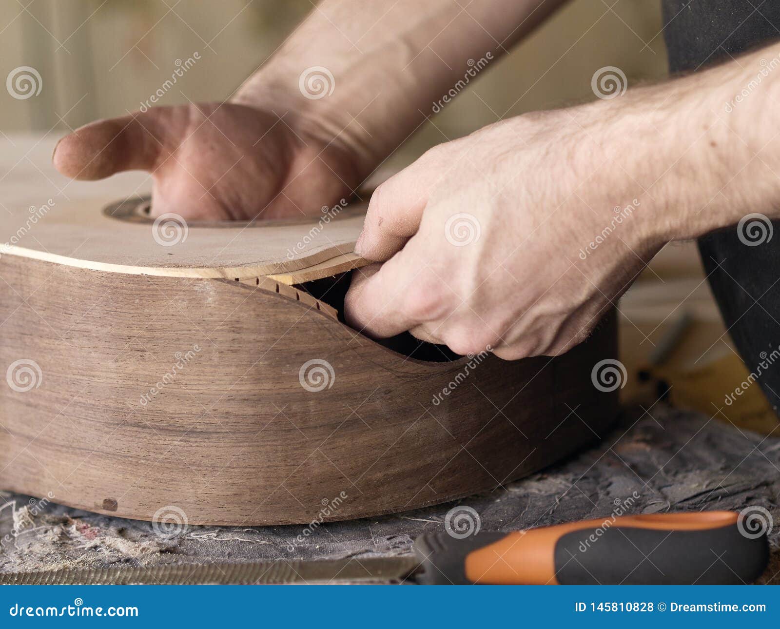 The Process of Making a Cutaway on Classical Guitar. Stock Photo ...