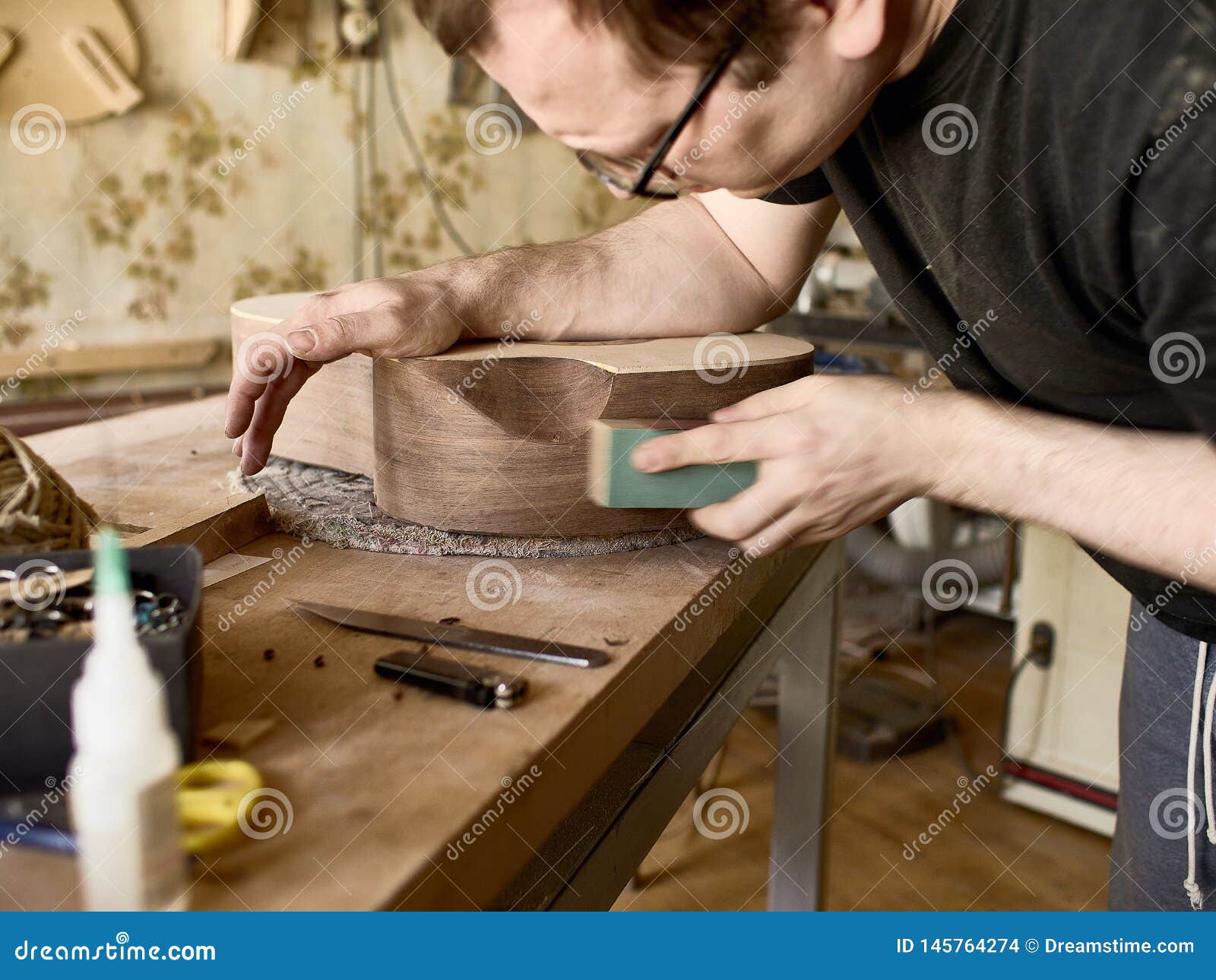 The Process of Making a Cutaway on Classical Guitar. Stock Photo ...