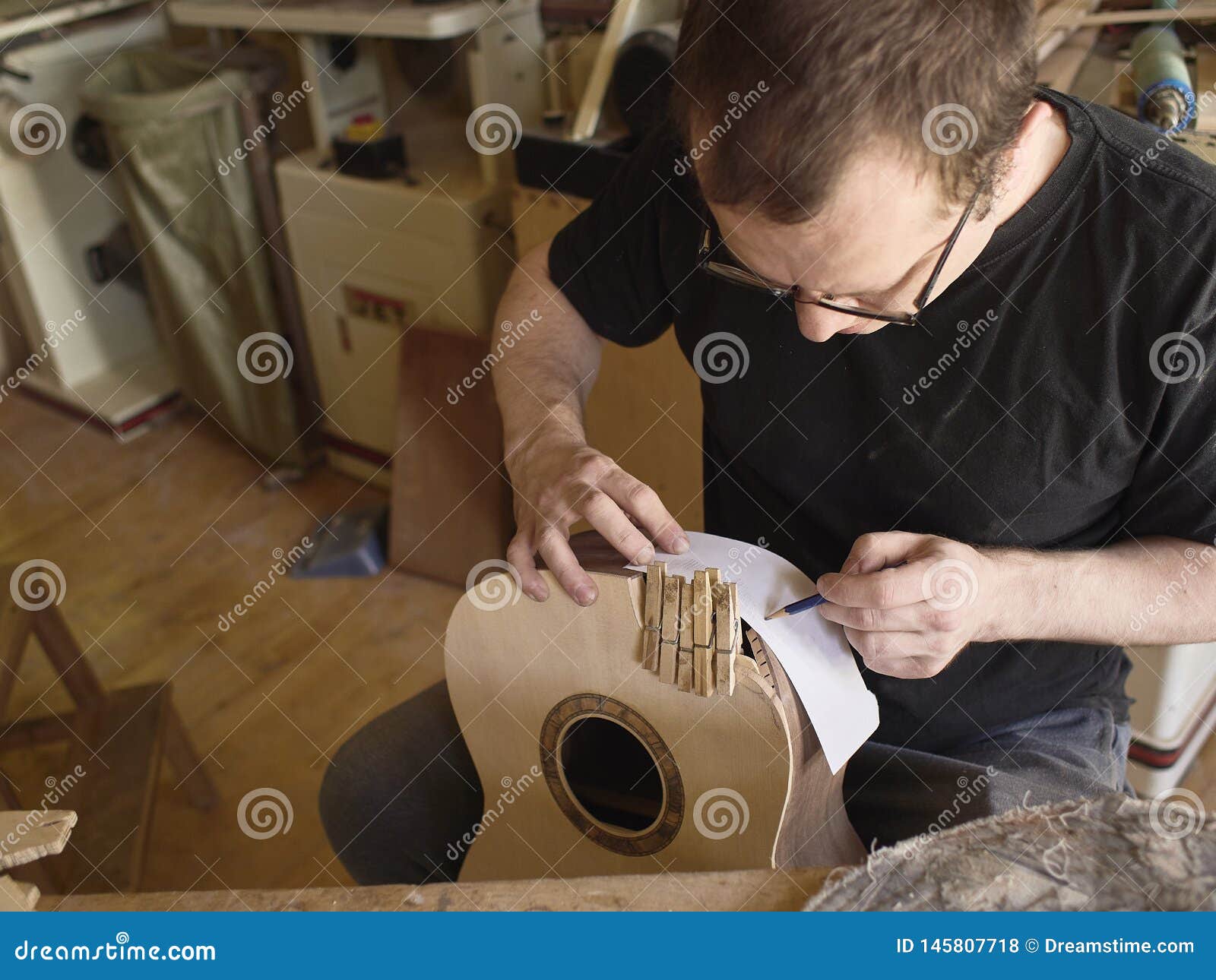 The Process of Making a Cutaway on Classical Guitar. Stock Photo ...