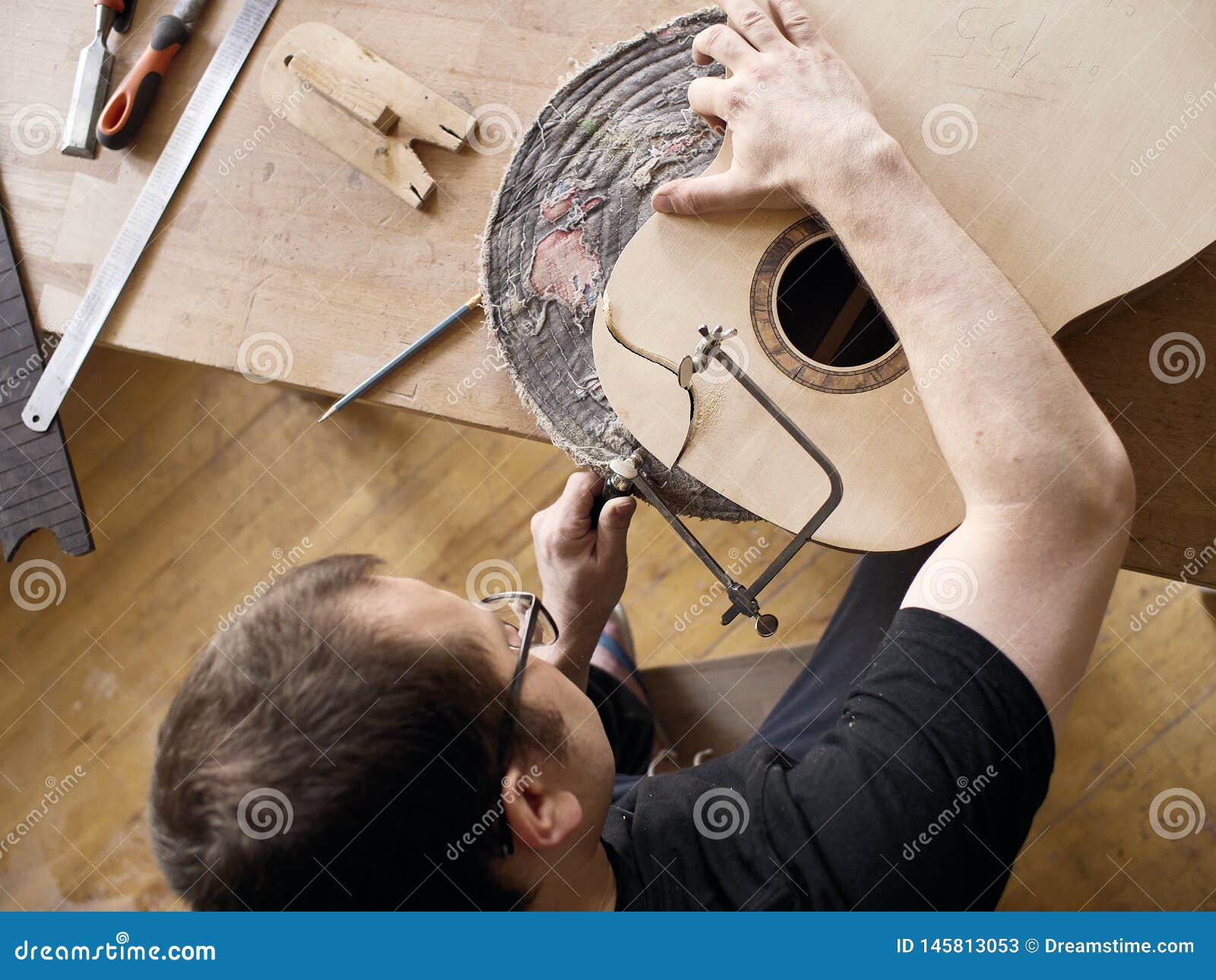 The Process of Making a Cutaway on Classical Guitar. Stock Image ...