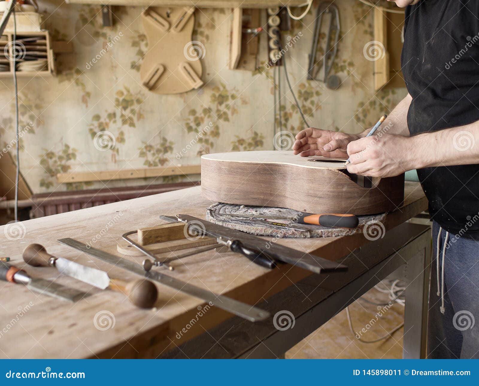 The Process of Making a Cutaway on Classical Guitar. Stock Image ...