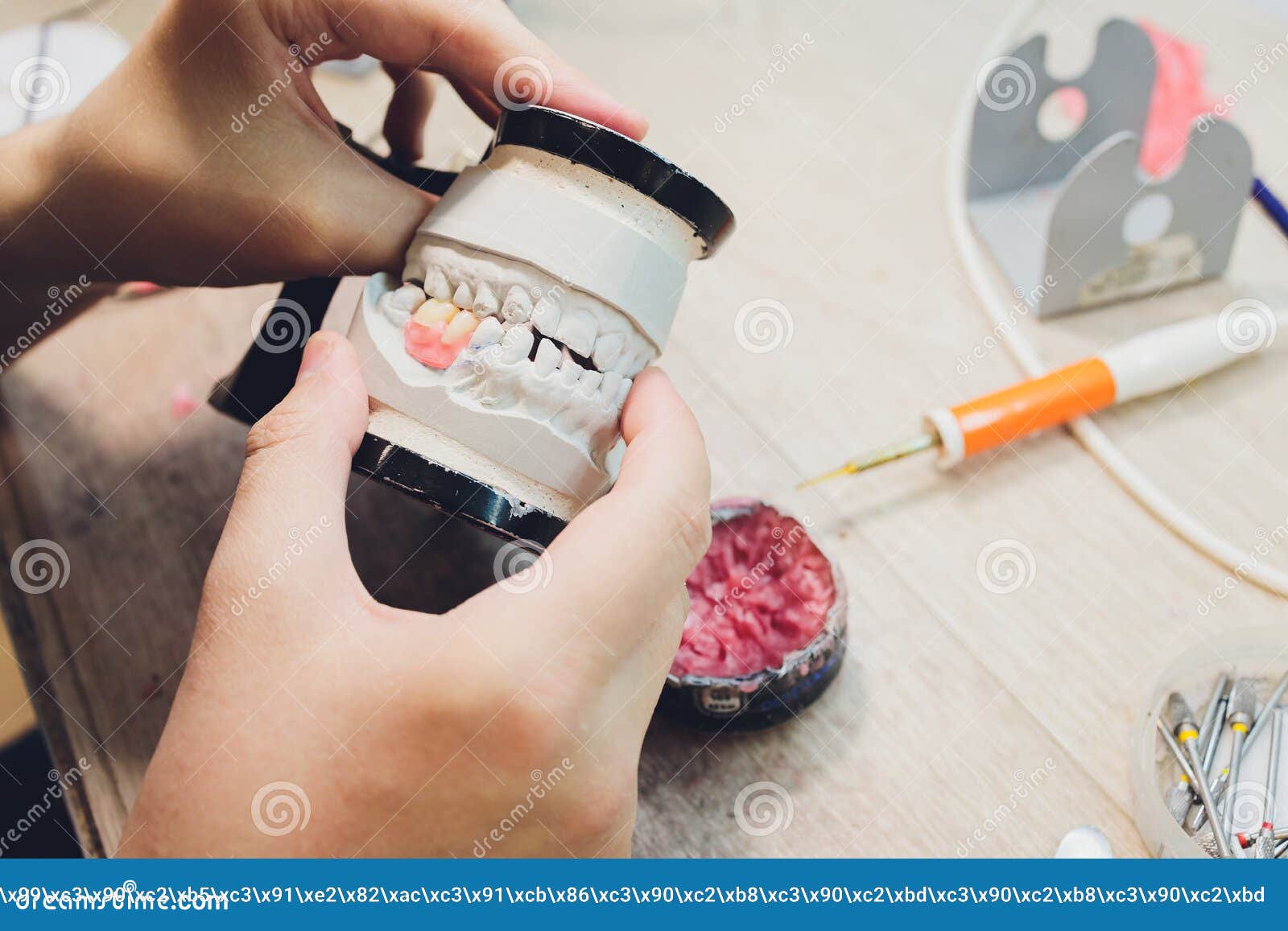 The Process of Making a Dental Prosthesis in a Dental Laboratory. Stock ...