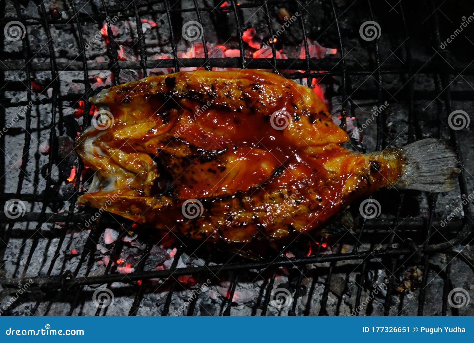The Process of Making Grilled Fish Using Fire from Charcoal Stock Image ...
