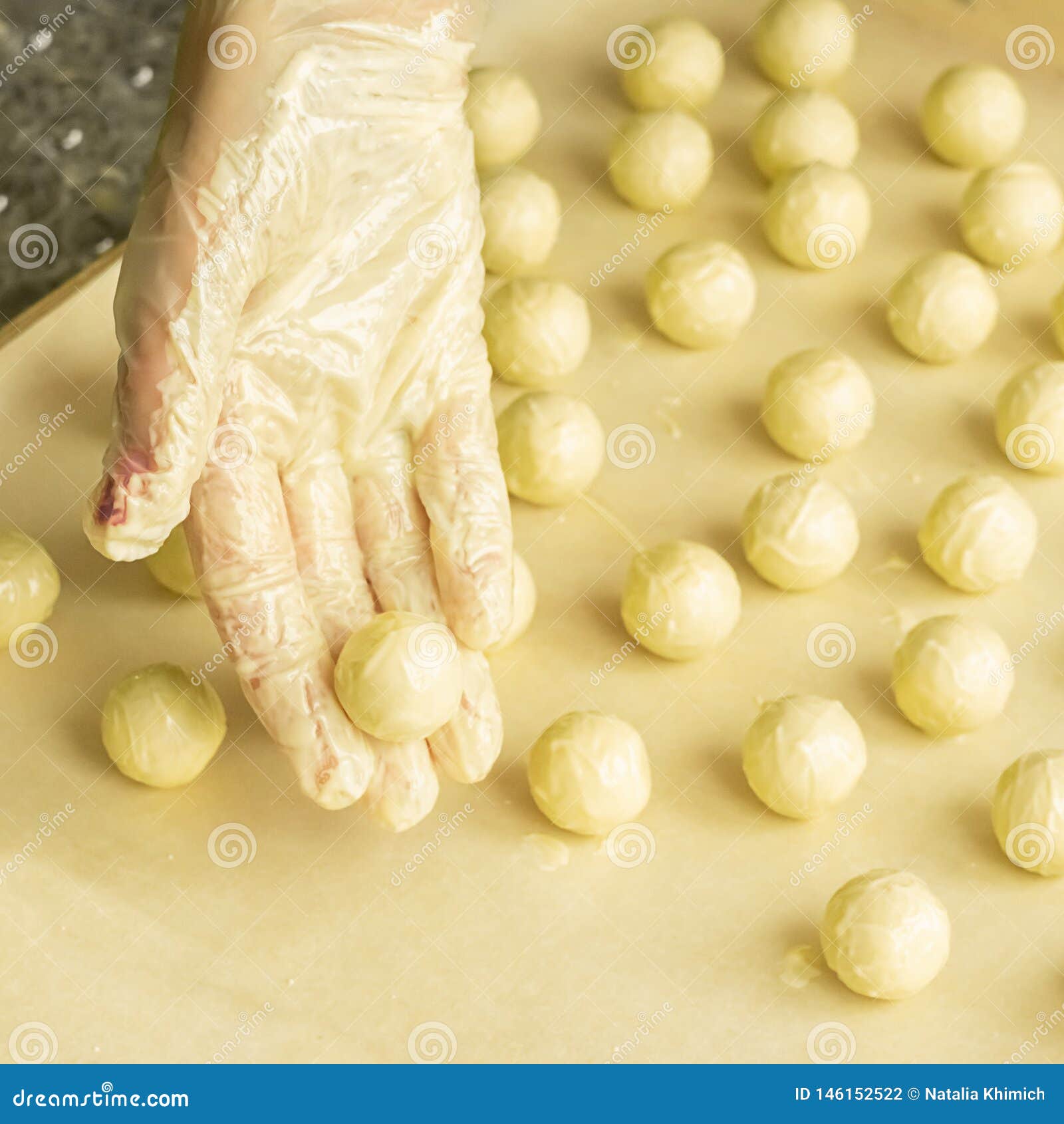 The Process of Making Handmade Chocolates. Round Chocolate Candies in ...