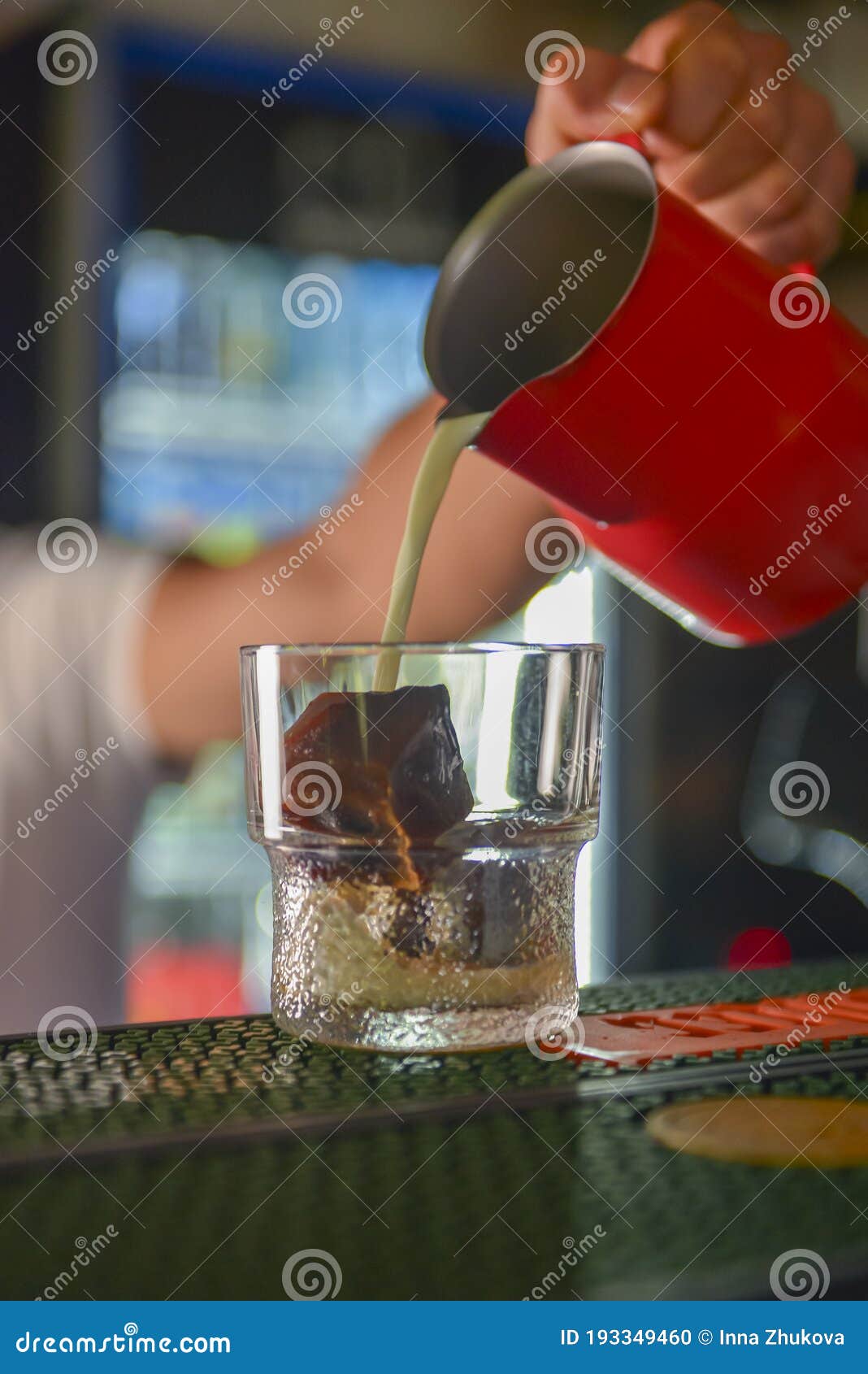 The Process of Making Iced Latte. Cold Summer Coffee Stock Photo ...