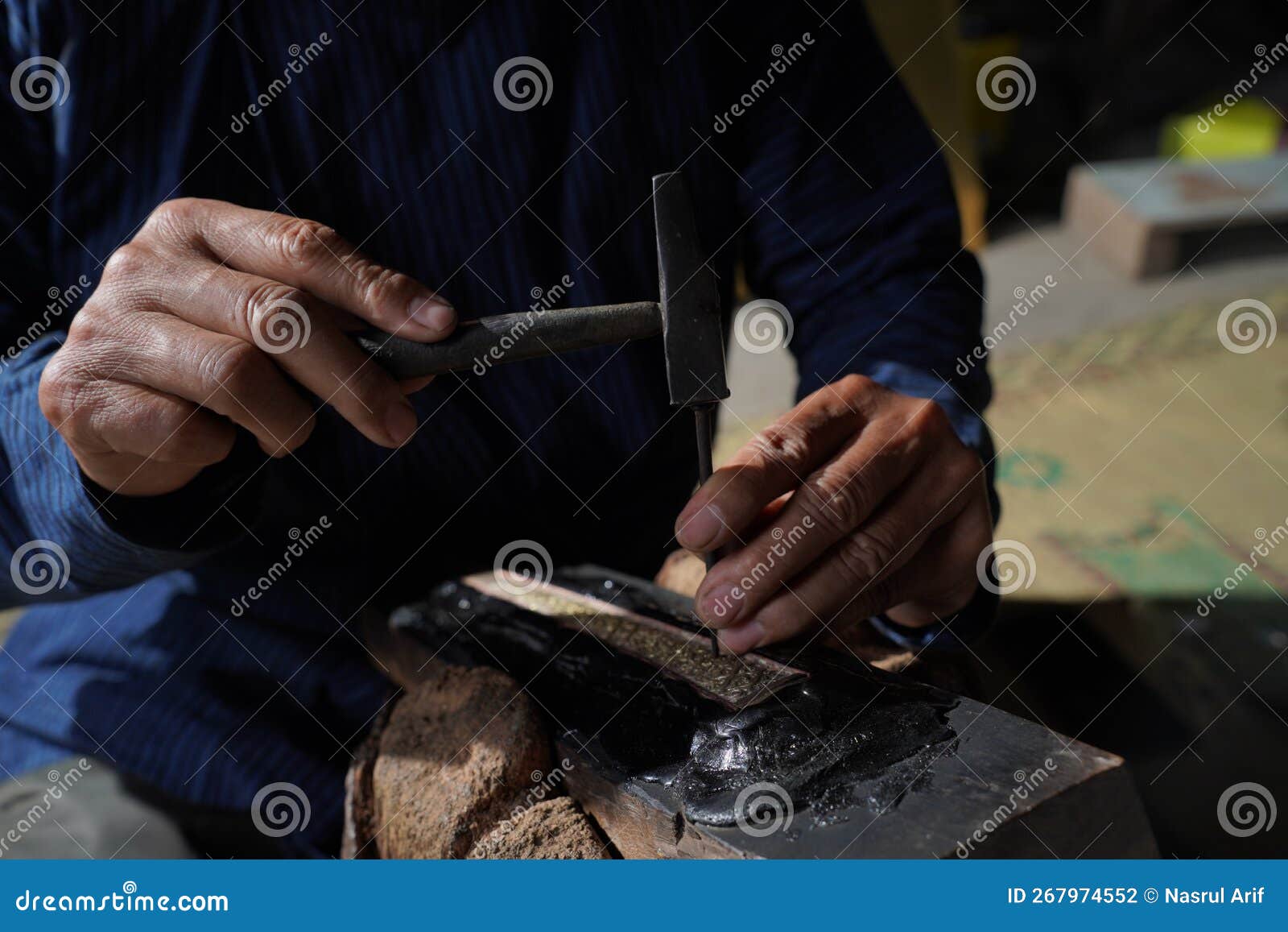 The Process of Making a Keris is Being Carved To Make Traditional ...