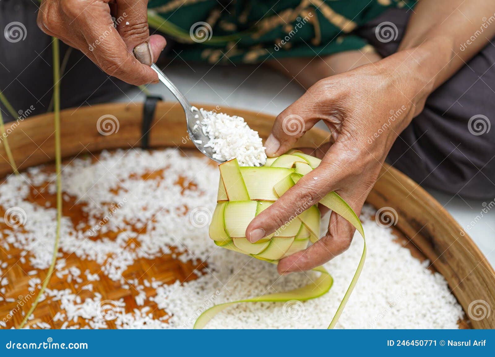 The Process of Making Ketupat is a Traditional Food during Eid. Put the ...