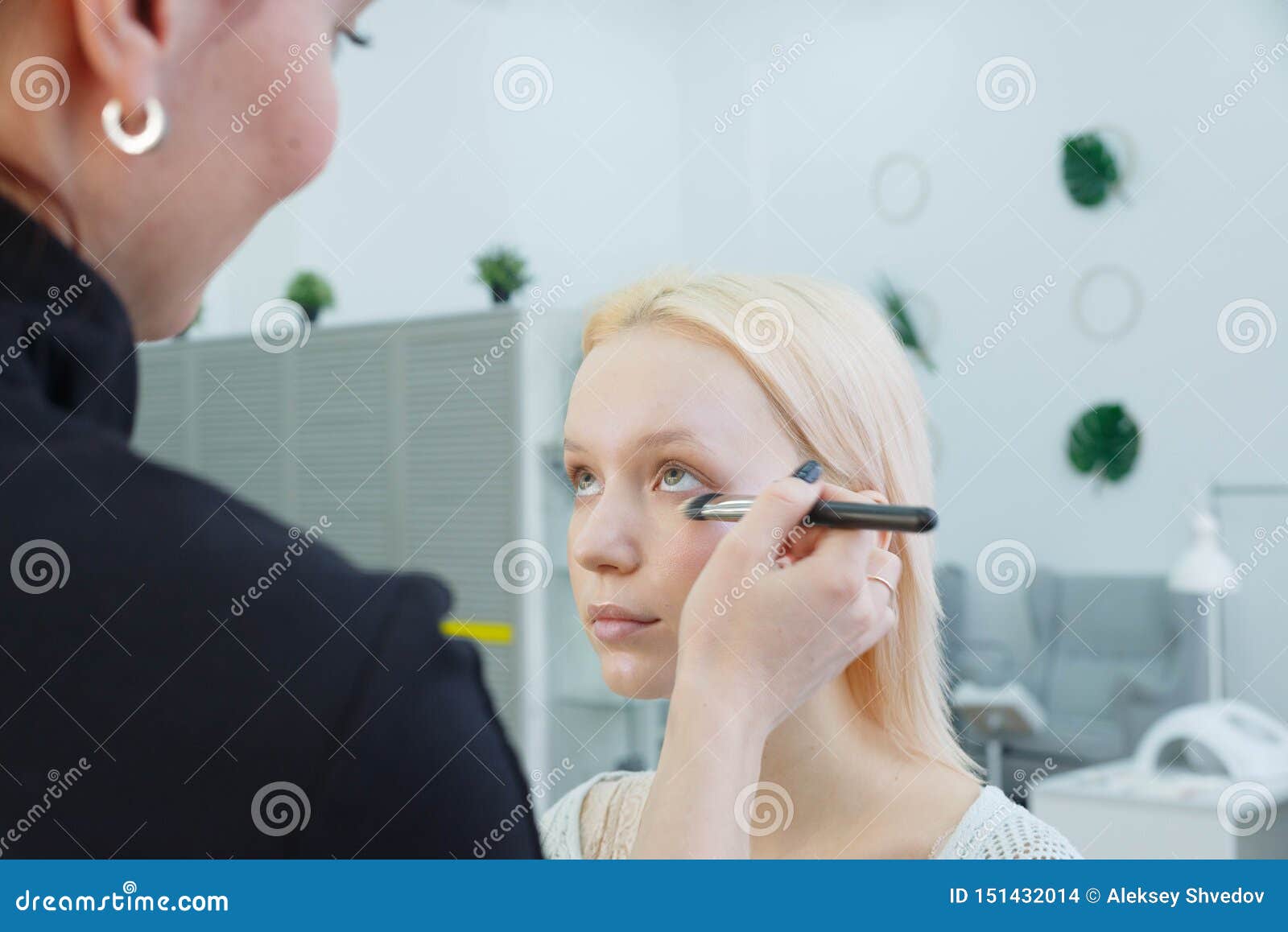 Process of Making Makeup. Make-up Artist Working with Brush on Model ...