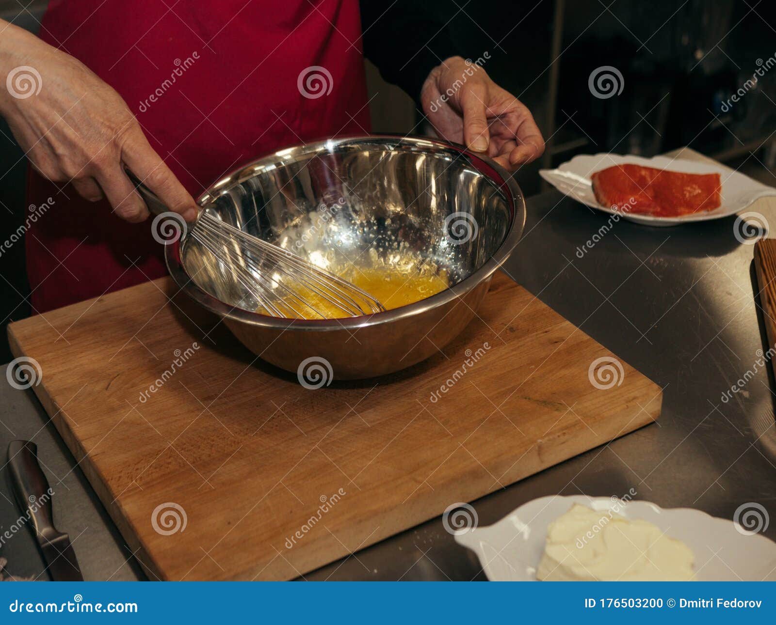 The Process of Making Pancakes. Cook in the Kitchen Makes the Dough ...