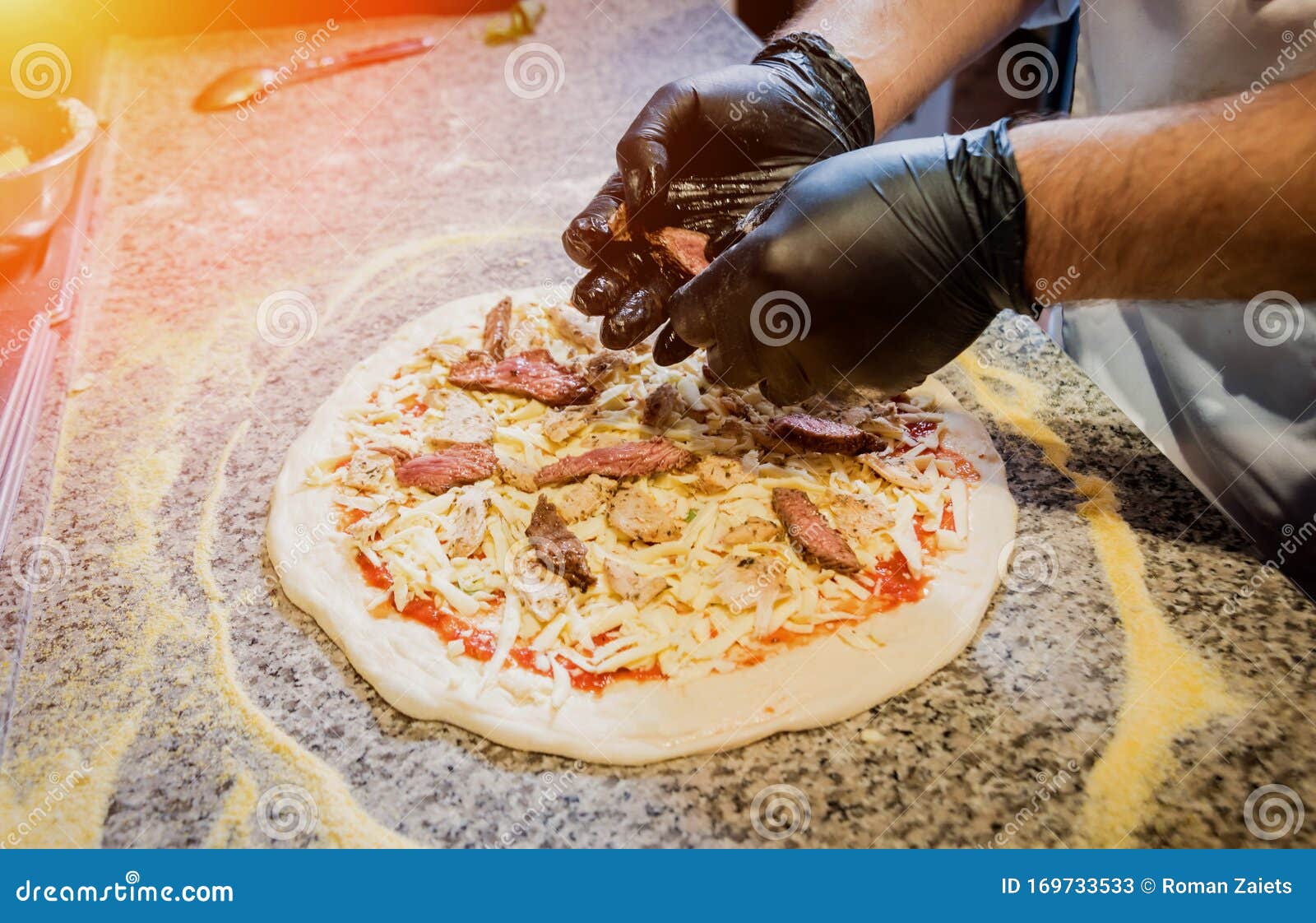 The Process of Making Pizza. Hands of Chef Baker Making Pizza at Cafe ...