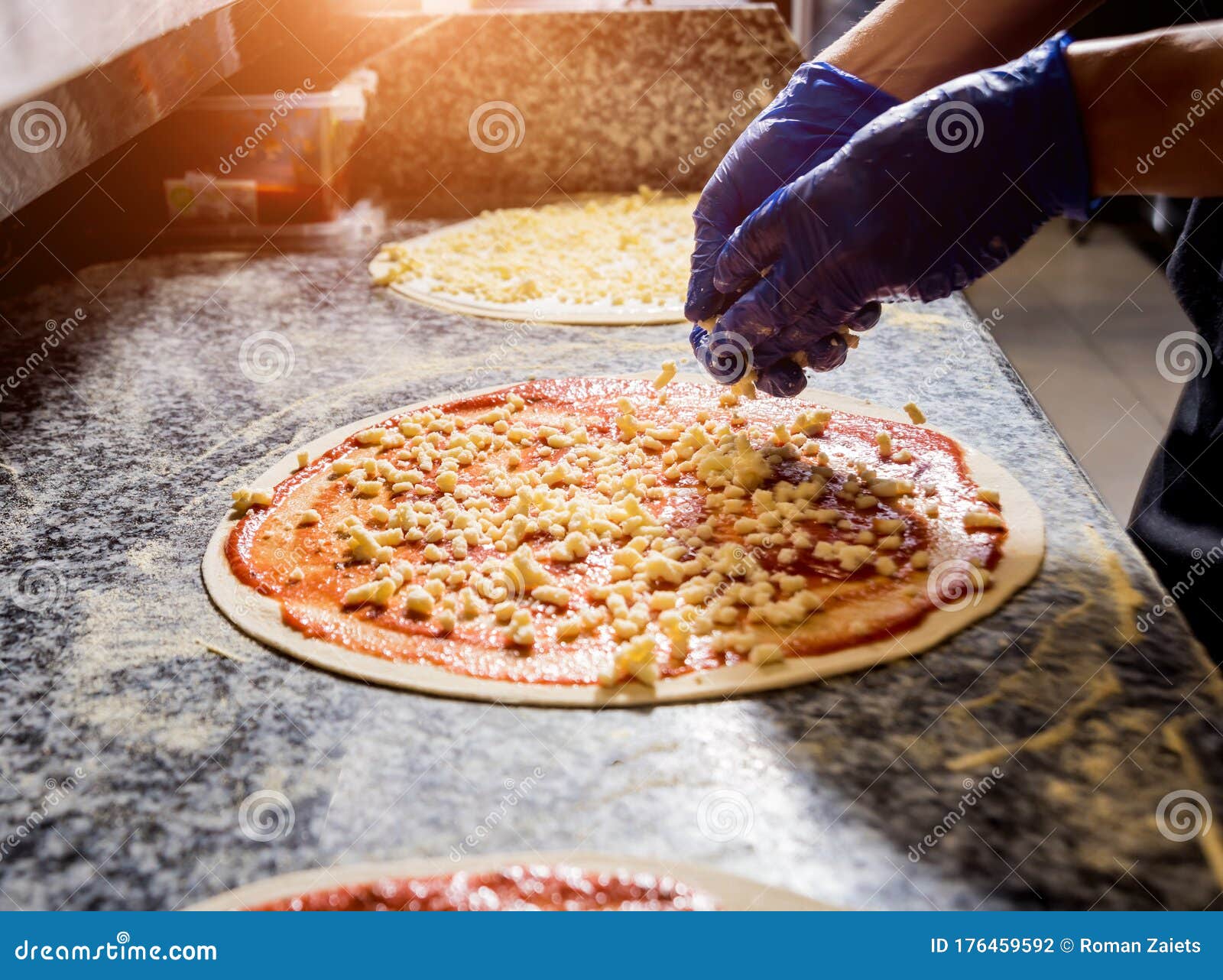 The Process of Making Pizza. Hands of Chef Baker Making Pizza at Cafe ...