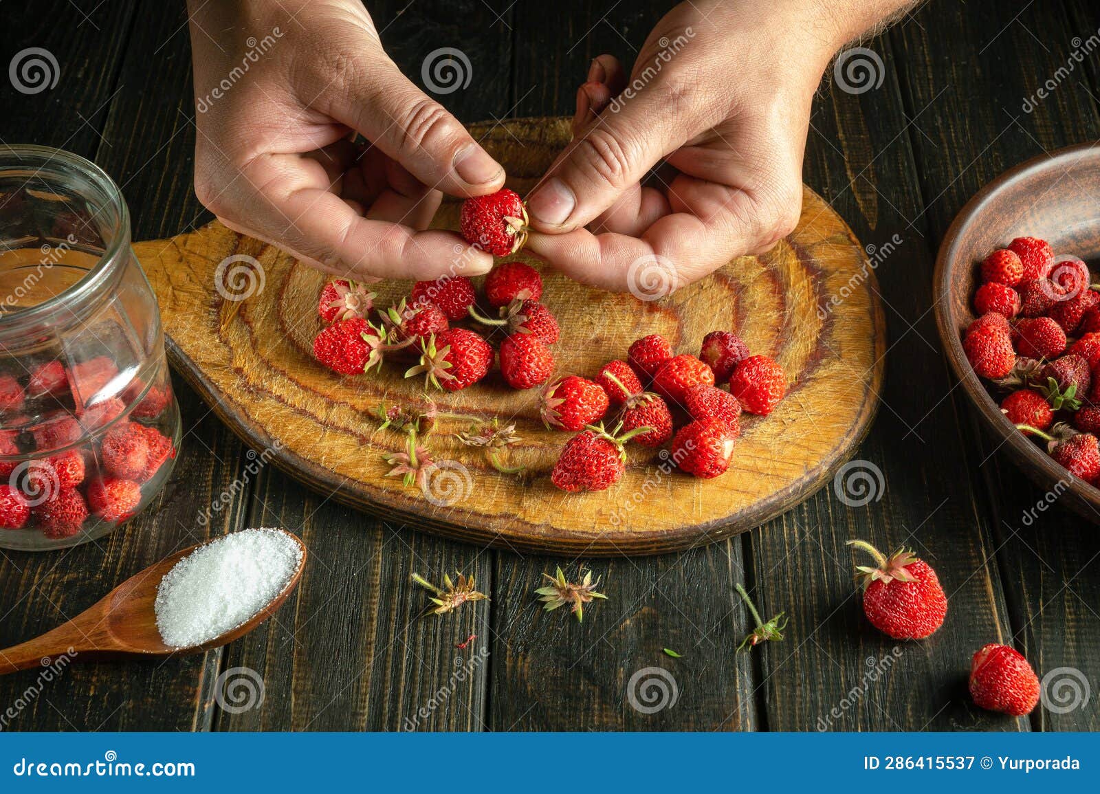 The Process of Making Strawberry Jam. Sorting Berries by the Hands of ...