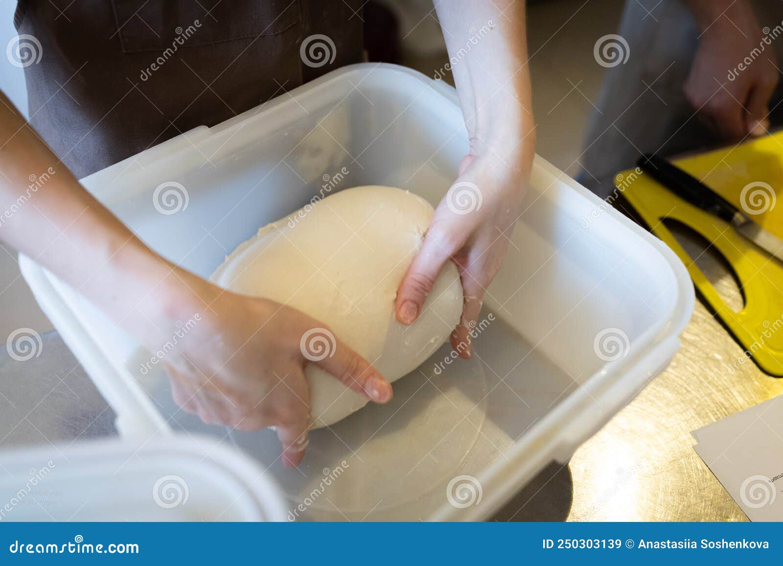 The Process of Making Wheat Bread in an Artisan Bakery. the Folding of ...