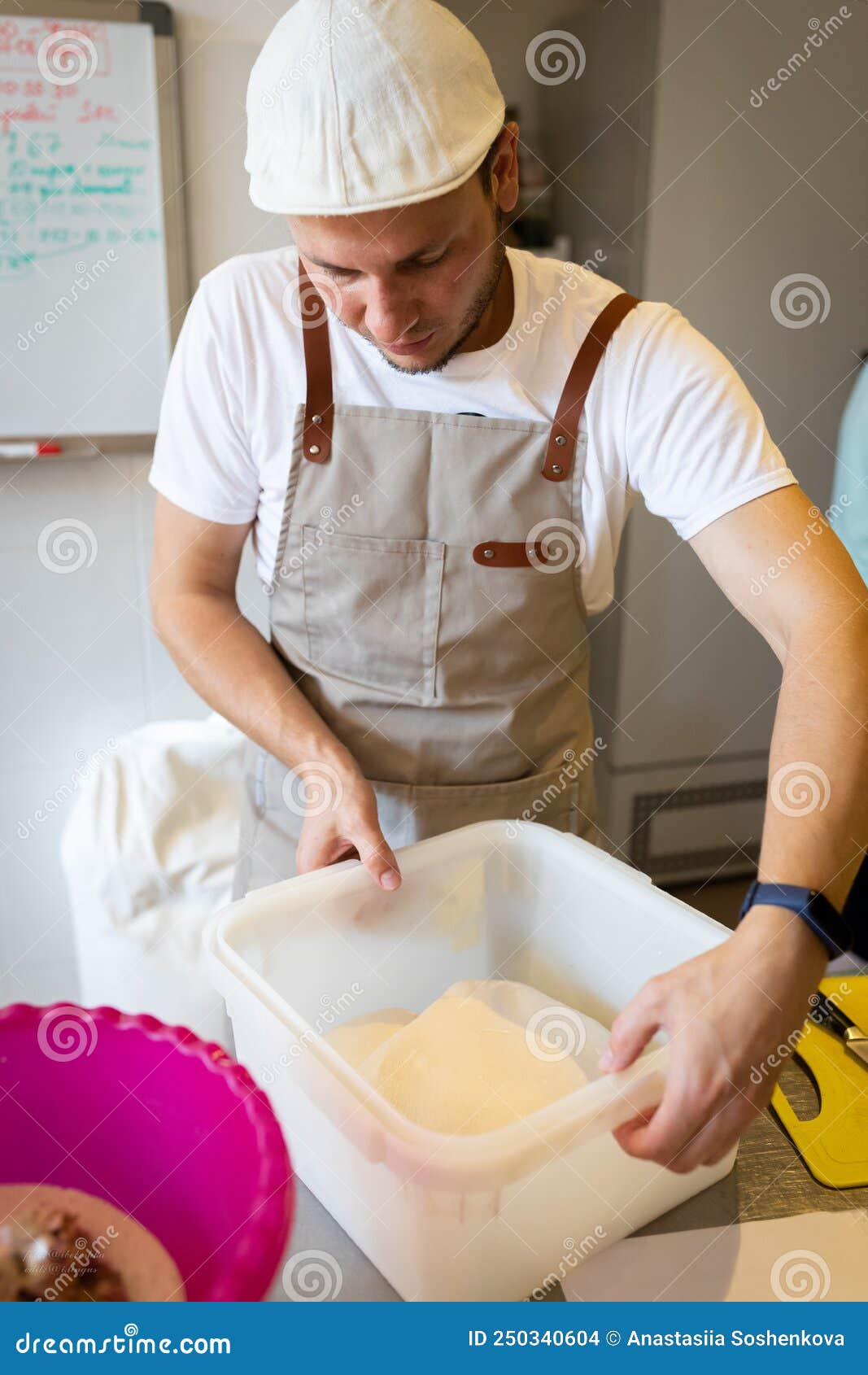 The Process of Making Wheat Bread in an Artisan Bakery. the Folding of ...