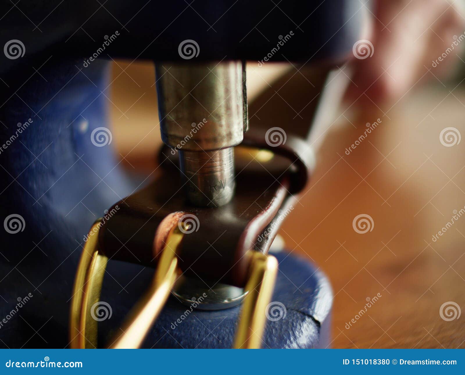 The Process of Manufacturing a Leather Belt by a Tanner. Workshop ...