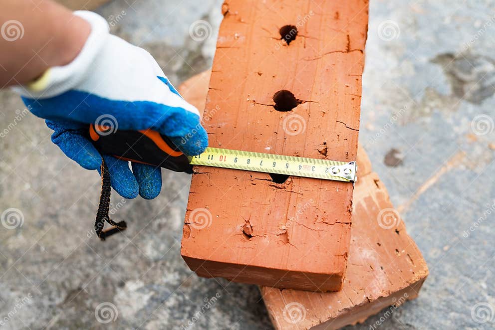 The Process of Measuring the Size of the Brick Stock Image - Image of ...