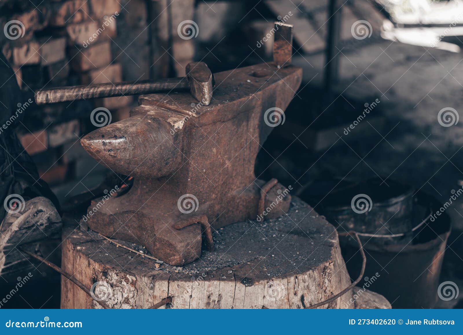 Process Metal with Hammer on Anvil in Forge. Strike Iron Outdoors in ...