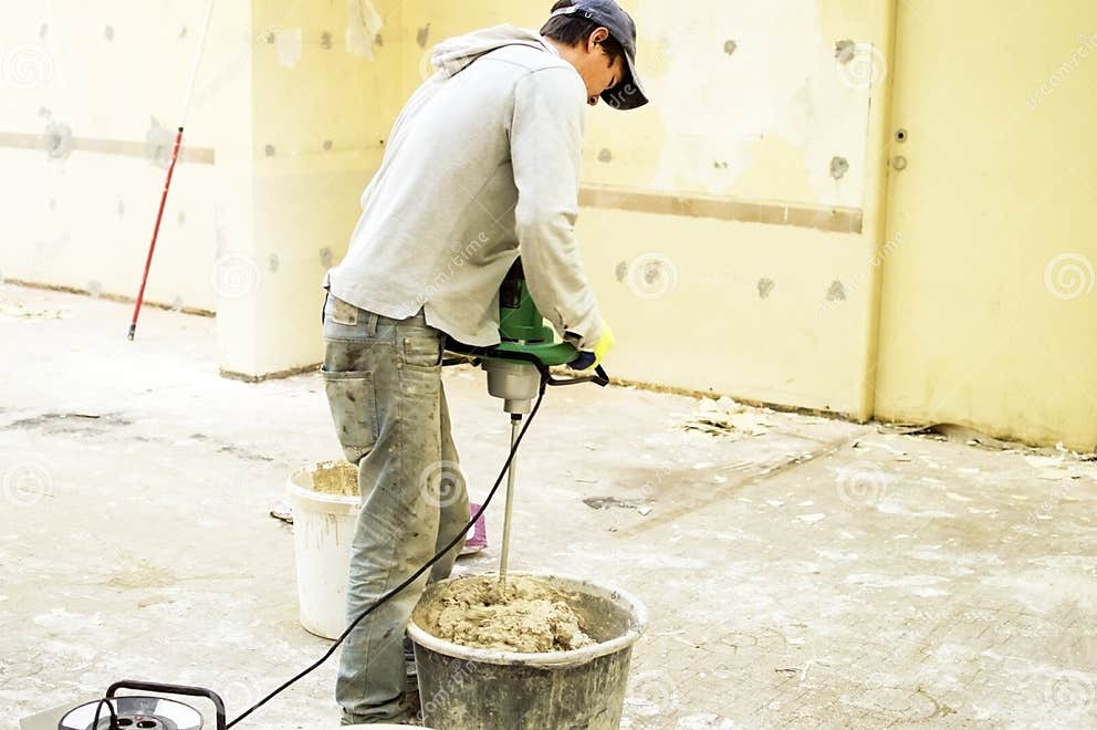 The Process of Mixing Putty Mixture for Construction Stock Image ...