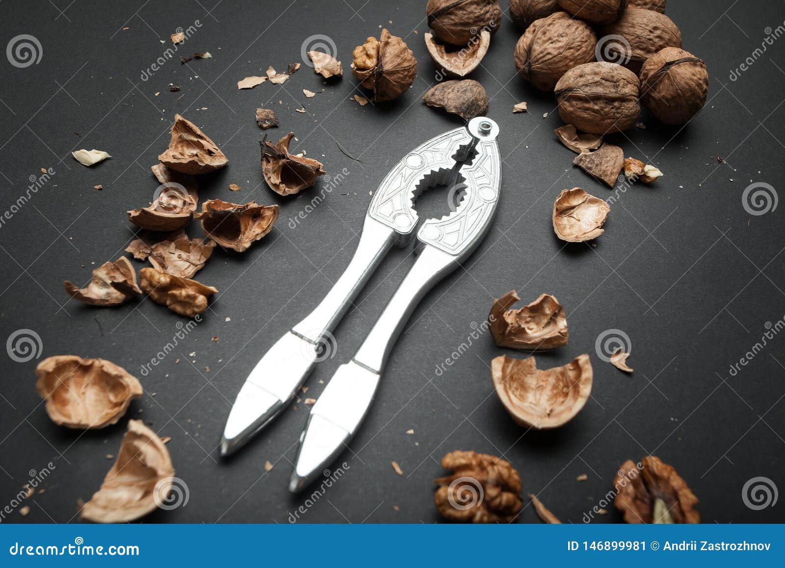 The Process of Opening the Core of the Walnut and Whole Walnuts on a ...