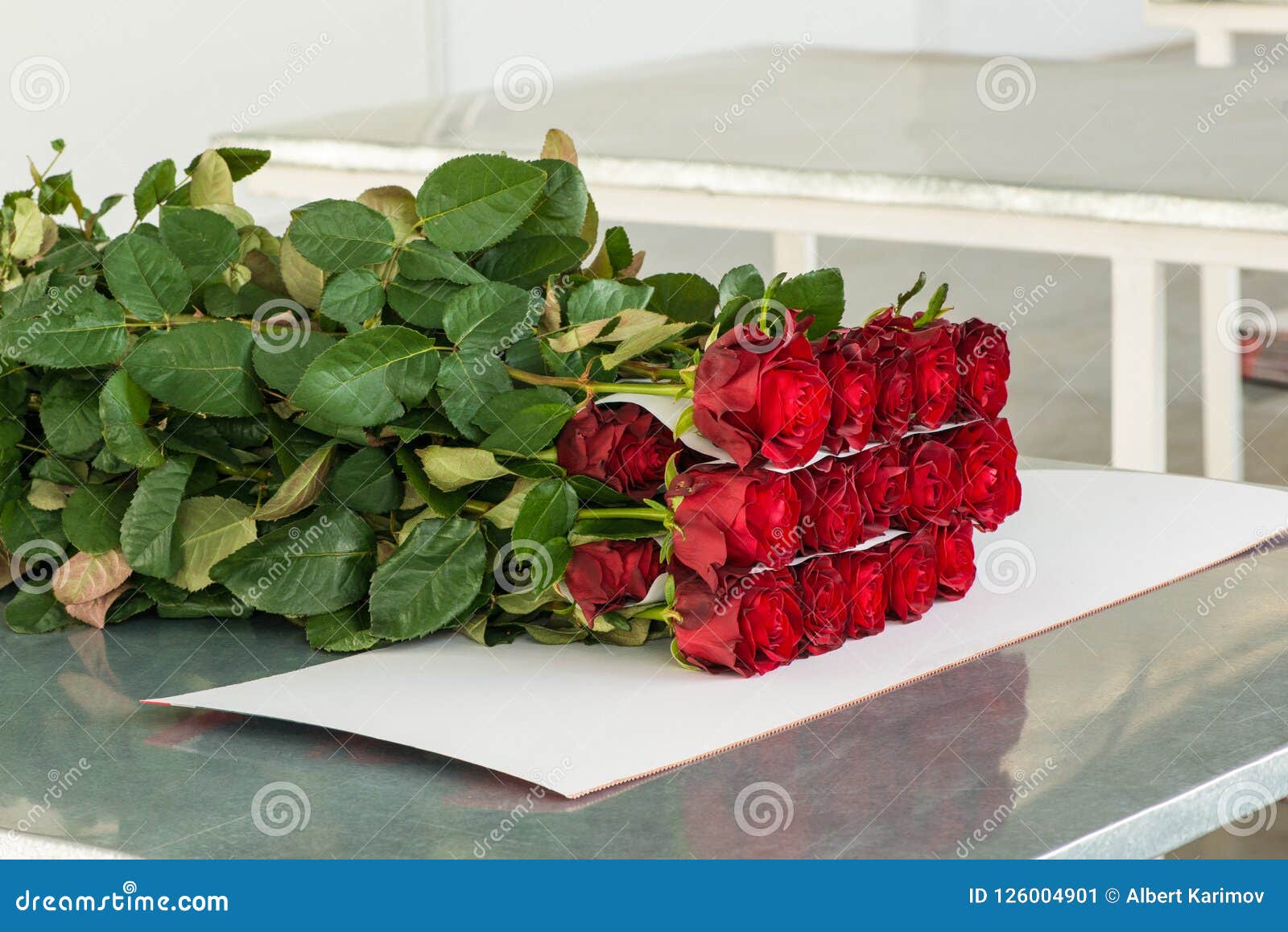 Flowers packaging process stock image. Image of design - 126004901