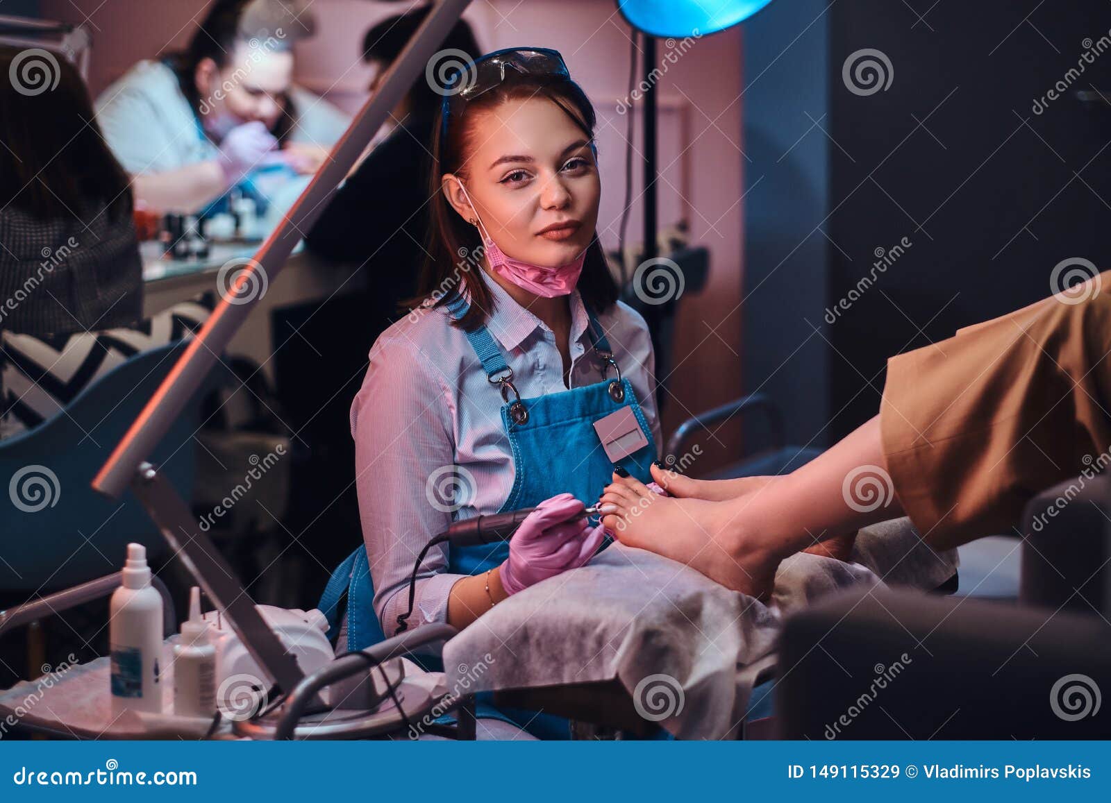 Customer is Getting Good Service from Diligent Nail Master. Stock Image ...