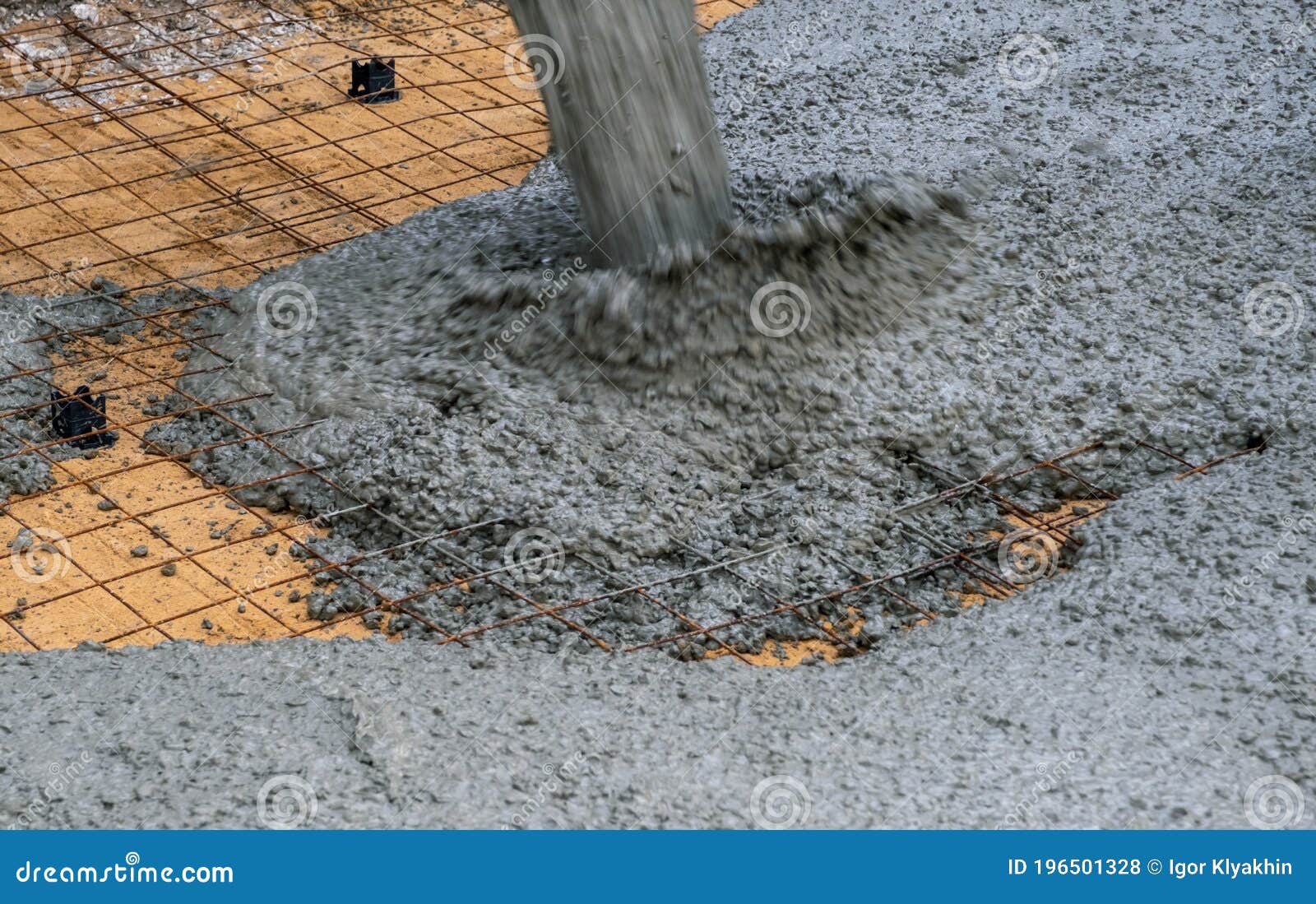 The Process of Pouring Concrete on a Prepared Base Made of Sand Stock ...