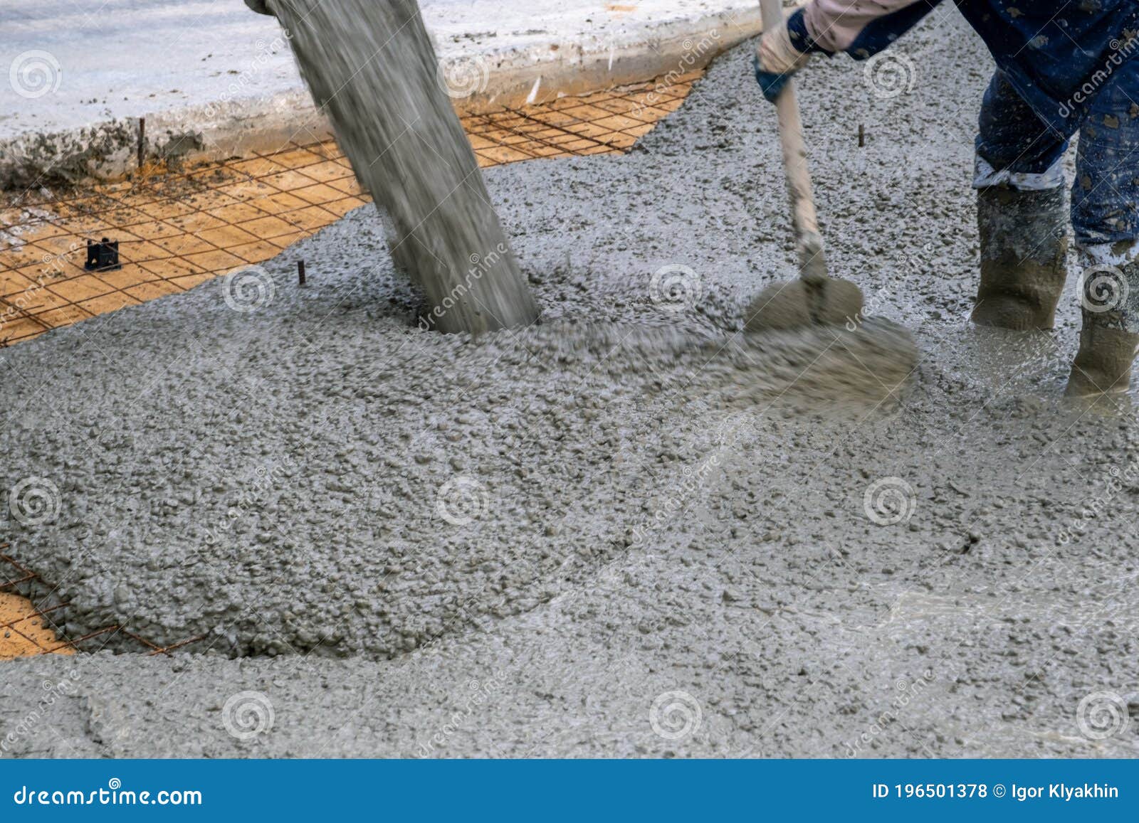 The Process of Pouring Concrete on a Prepared Base Made of Sand Stock ...