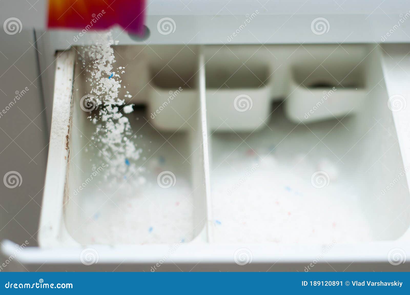 The Process of Pouring Powder into a Washing Machine Stock Image ...